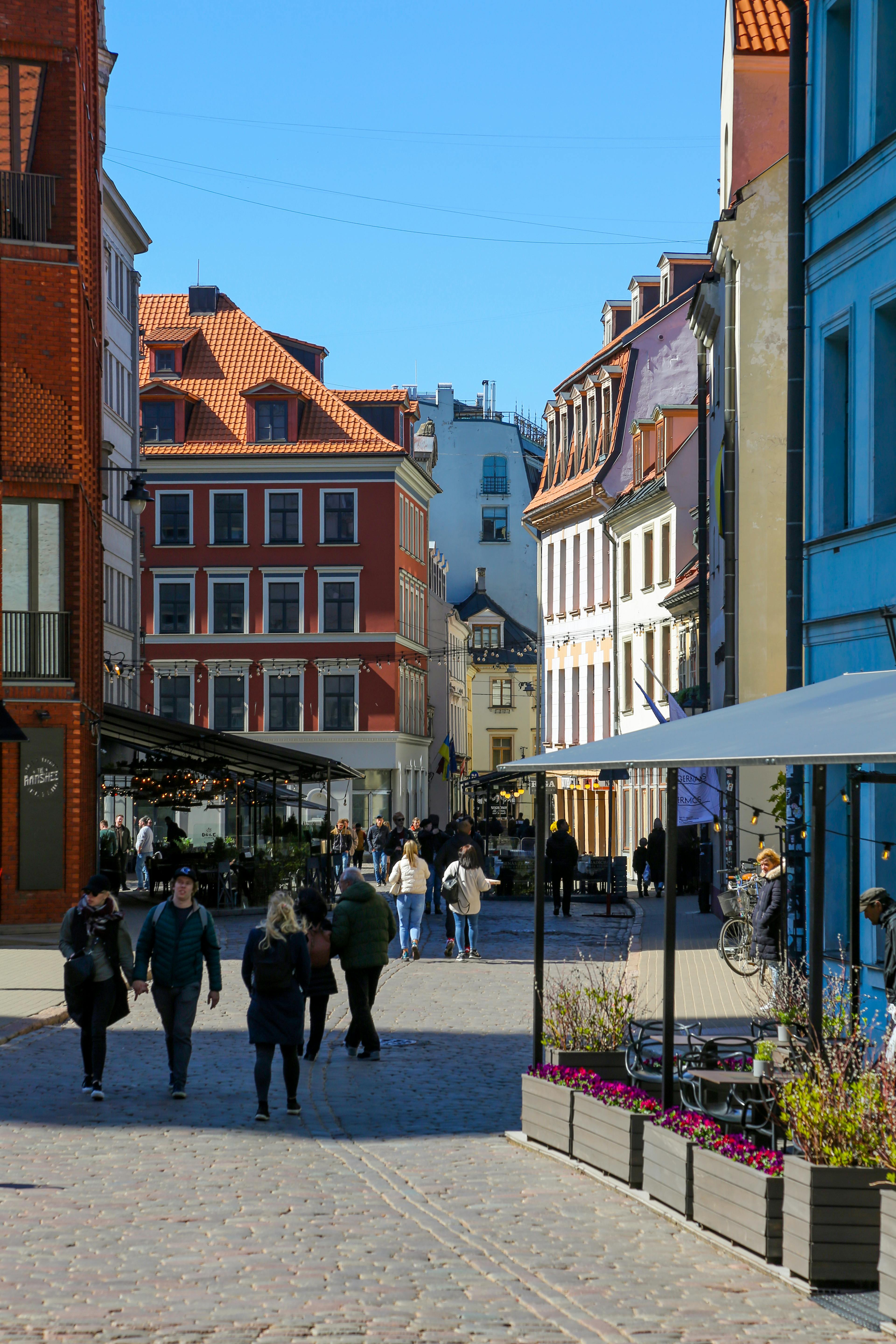 People Walking on an Old Town in Riga · Free Stock Photo