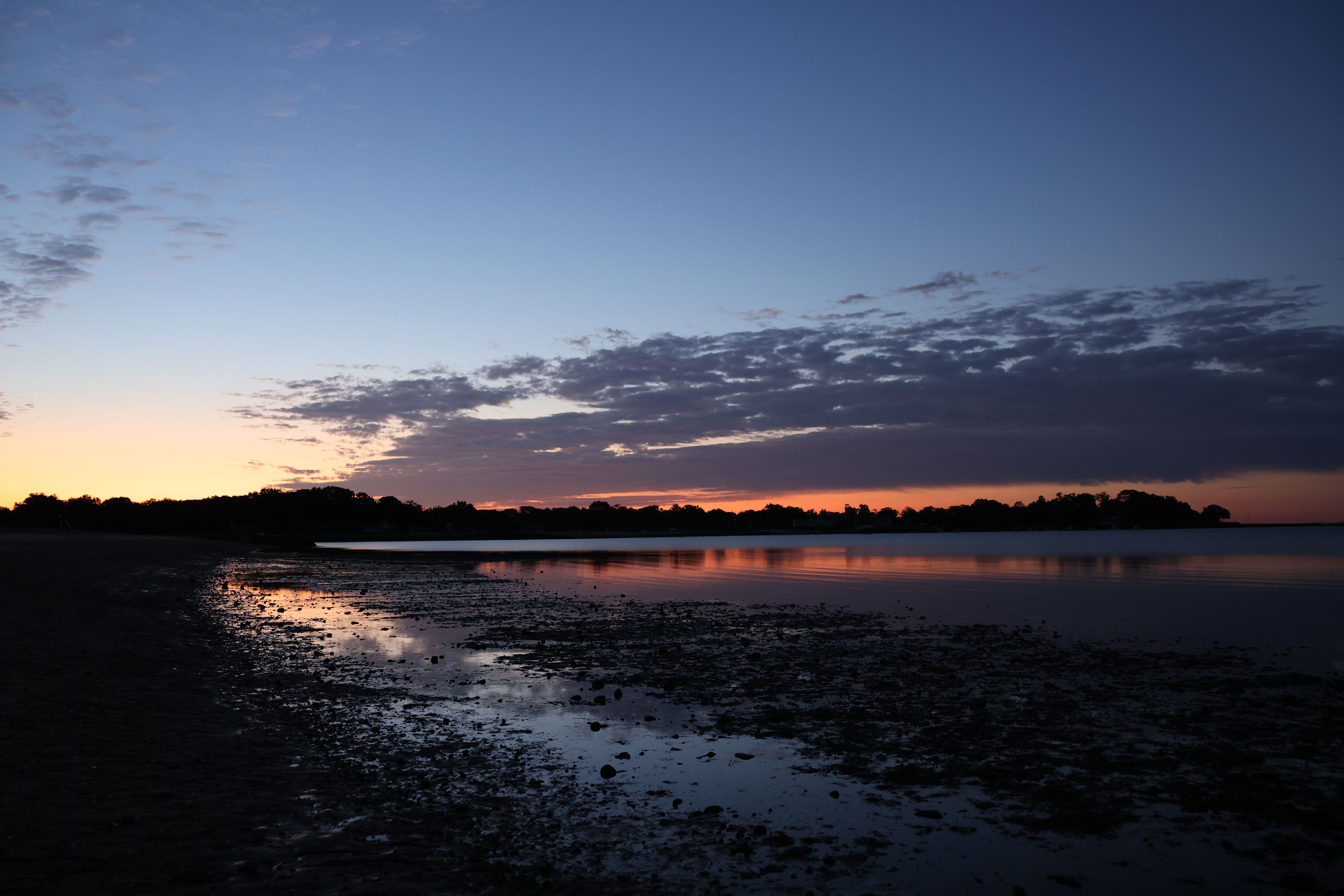 Dark Lakeshore at Sunset · Free Stock Photo