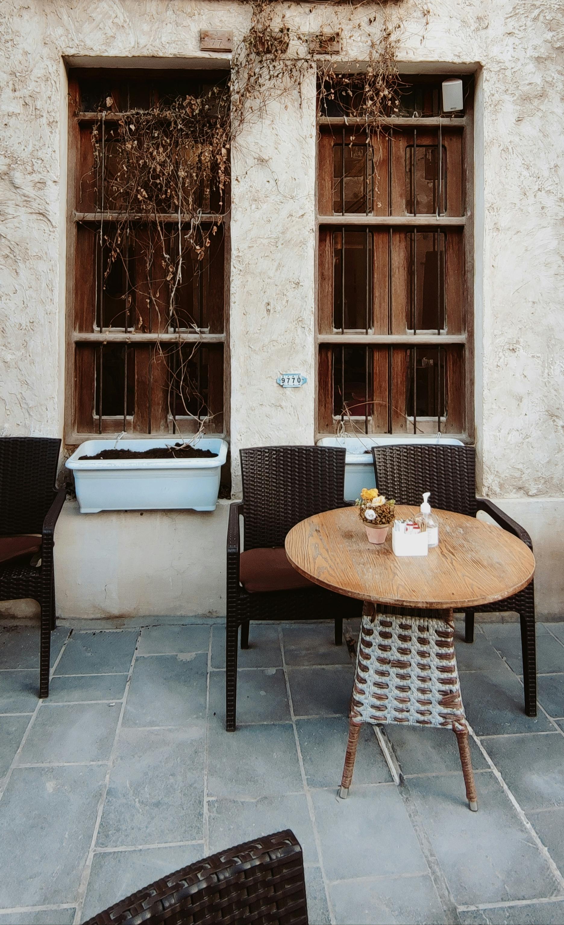 Table and Armchairs on Pavement · Free Stock Photo