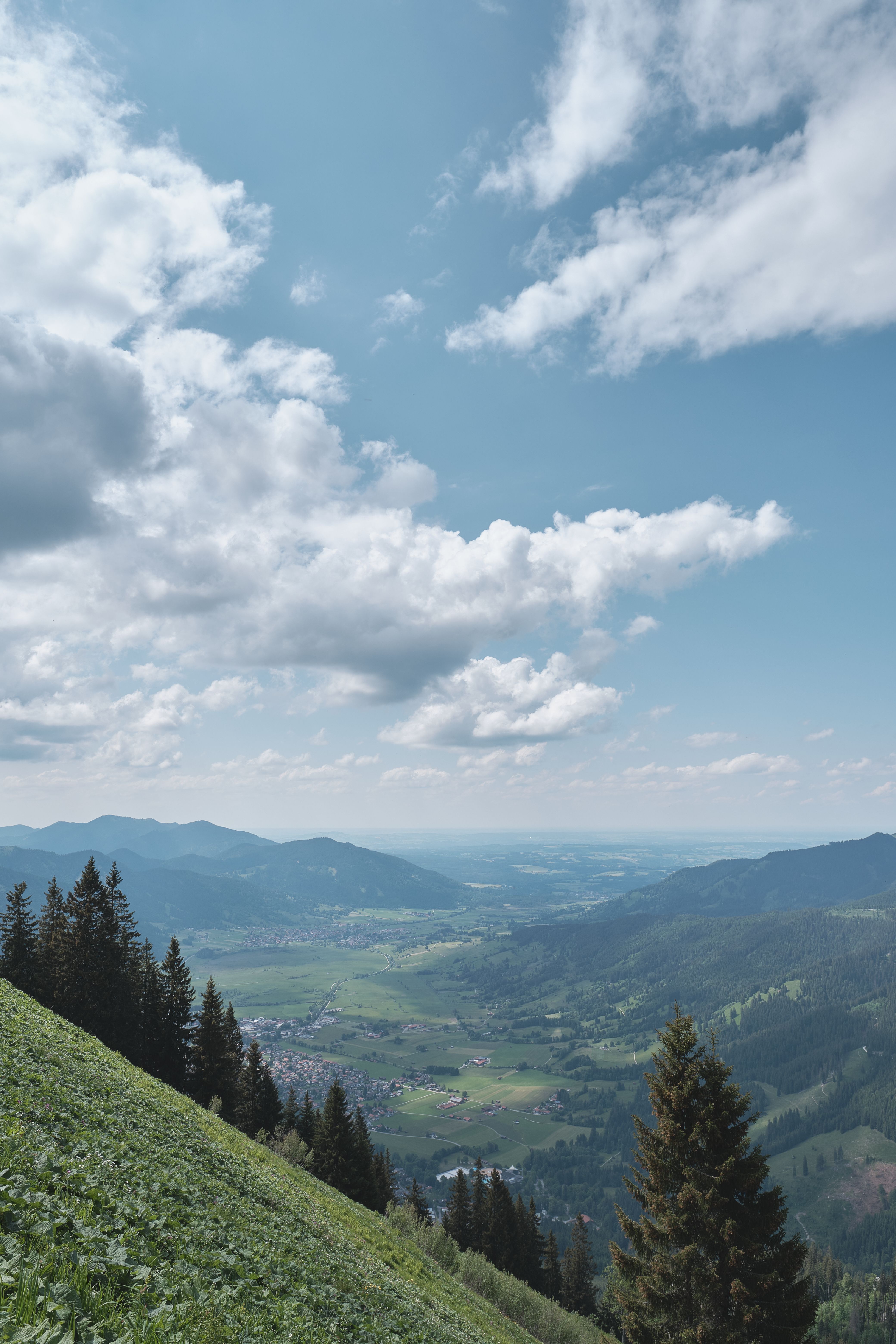 Fluffy White Clouds over Mountains · Free Stock Photo