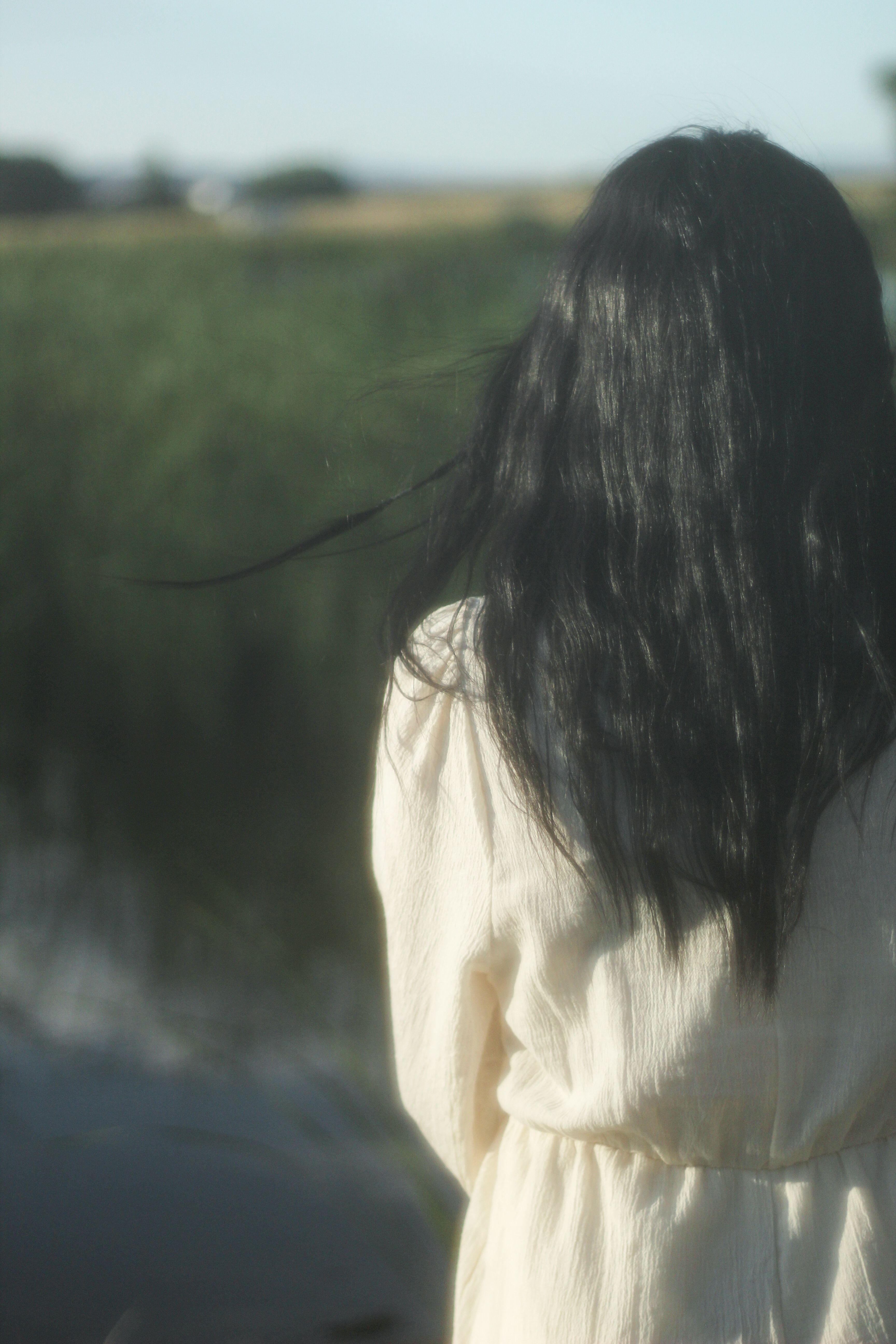 Woman in Mask Turning Back · Free Stock Photo