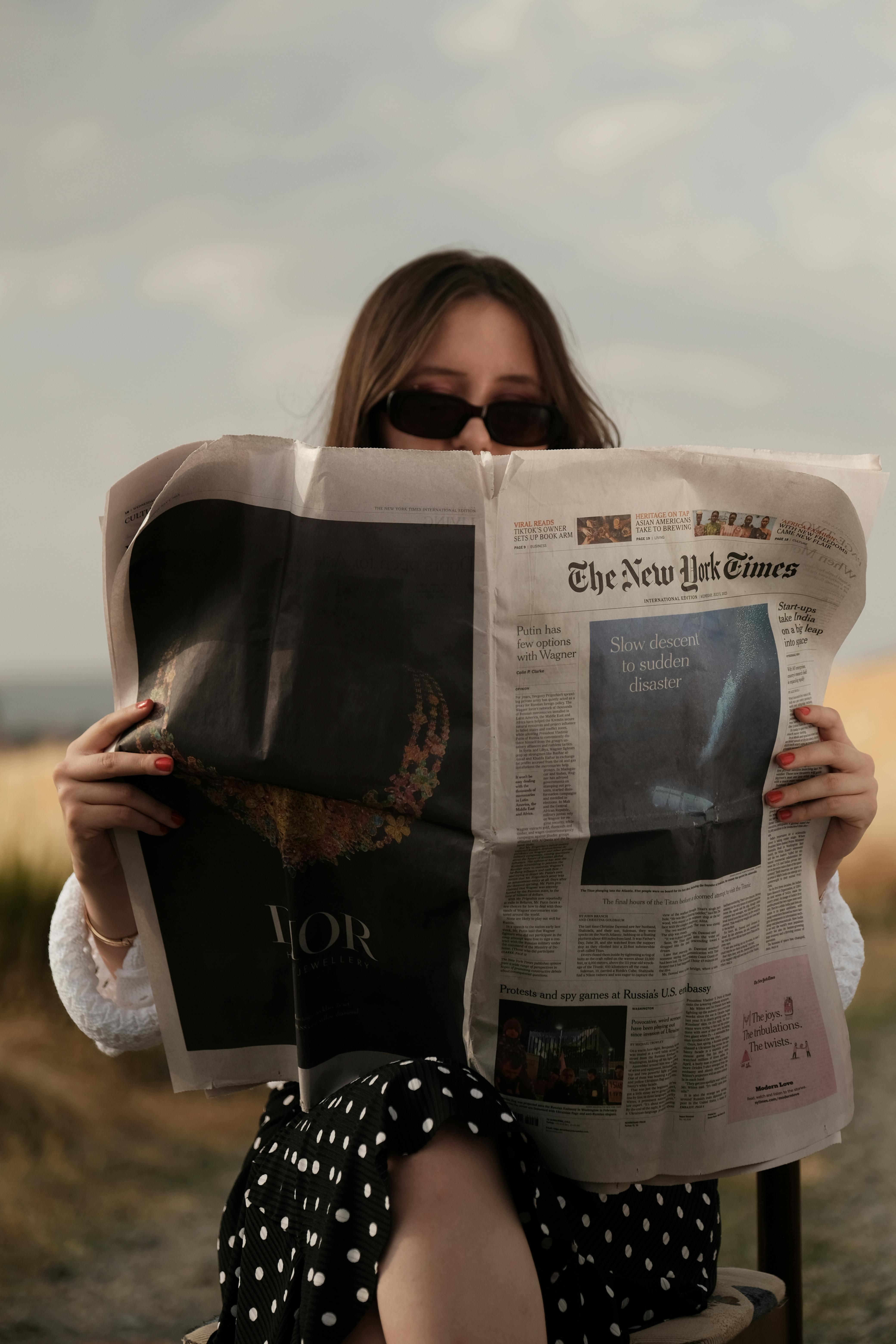 Man Reading a Newspaper · Free Stock Photo