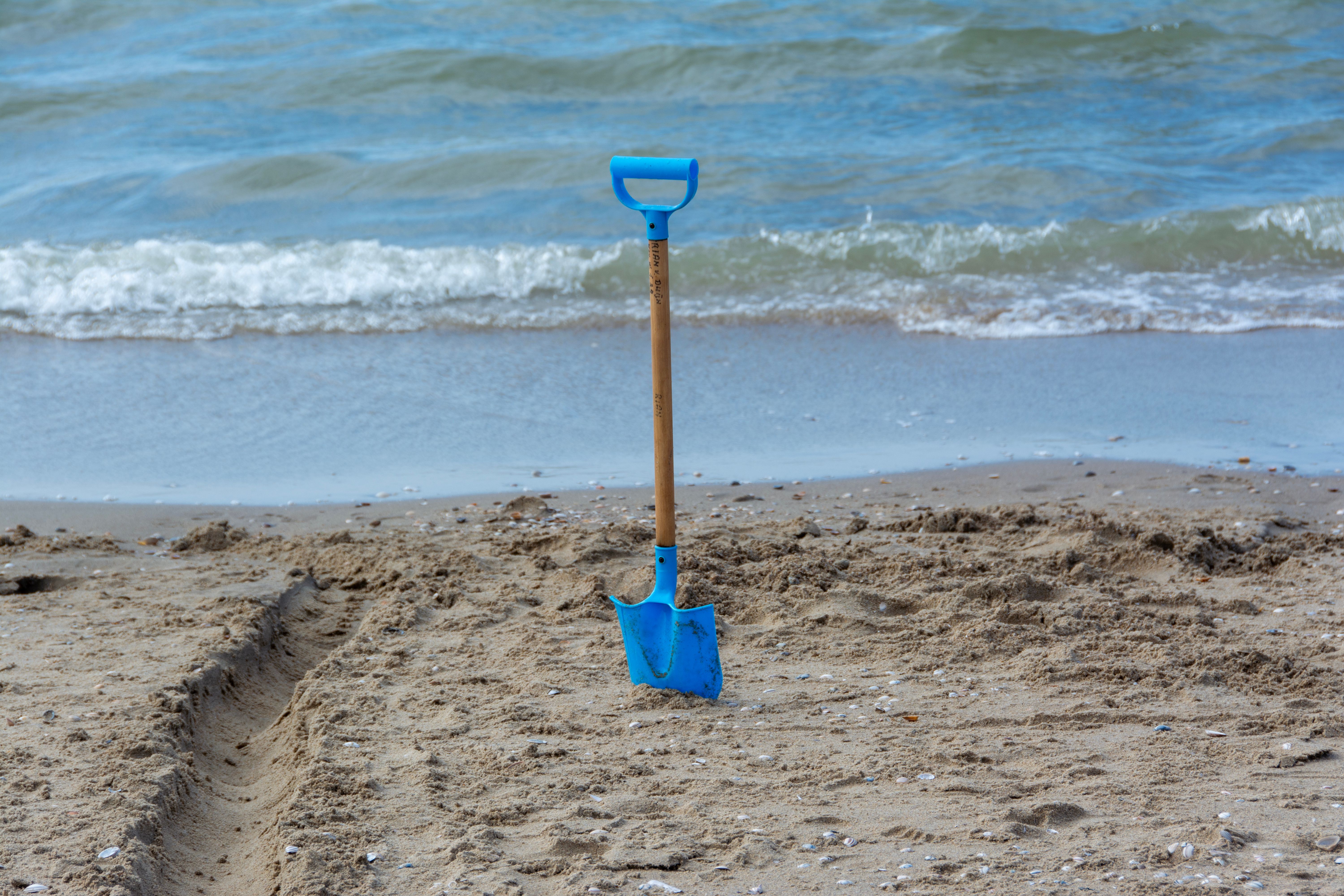 Shovel in Sand on Beach · Free Stock Photo