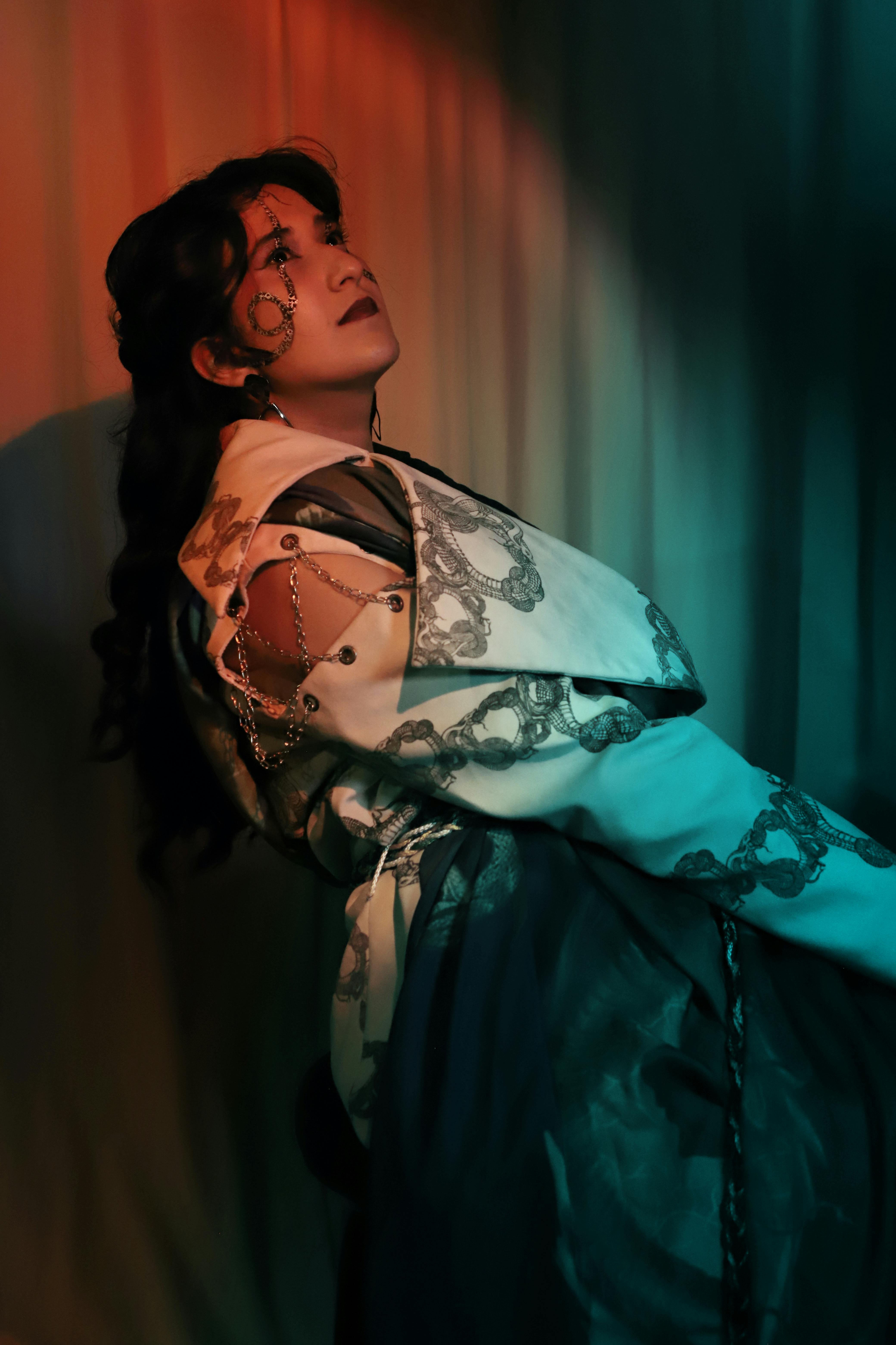 Woman in Fancy Dress Looks Up · Free Stock Photo