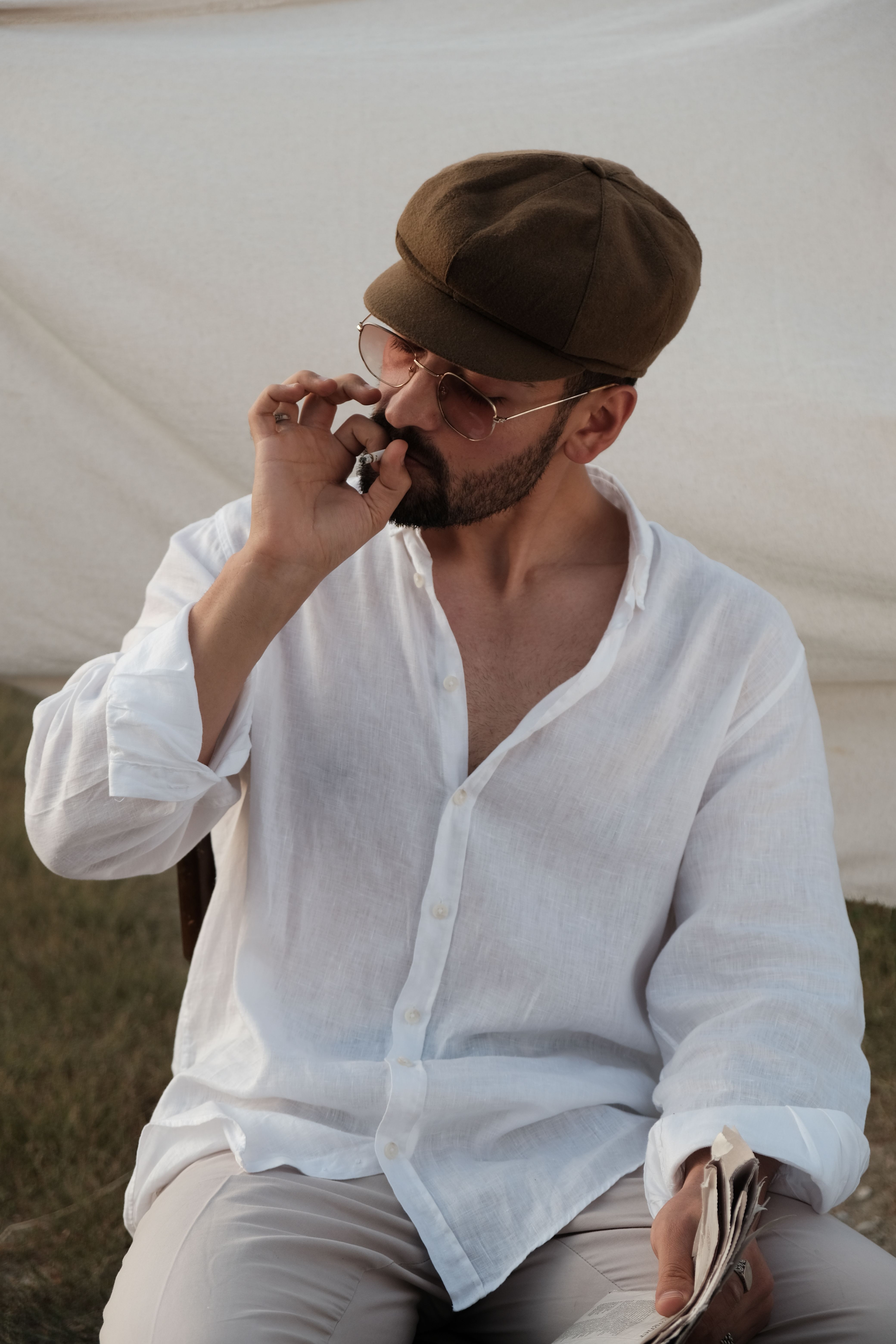 Man Smoking Cigarette at Sunset · Free Stock Photo