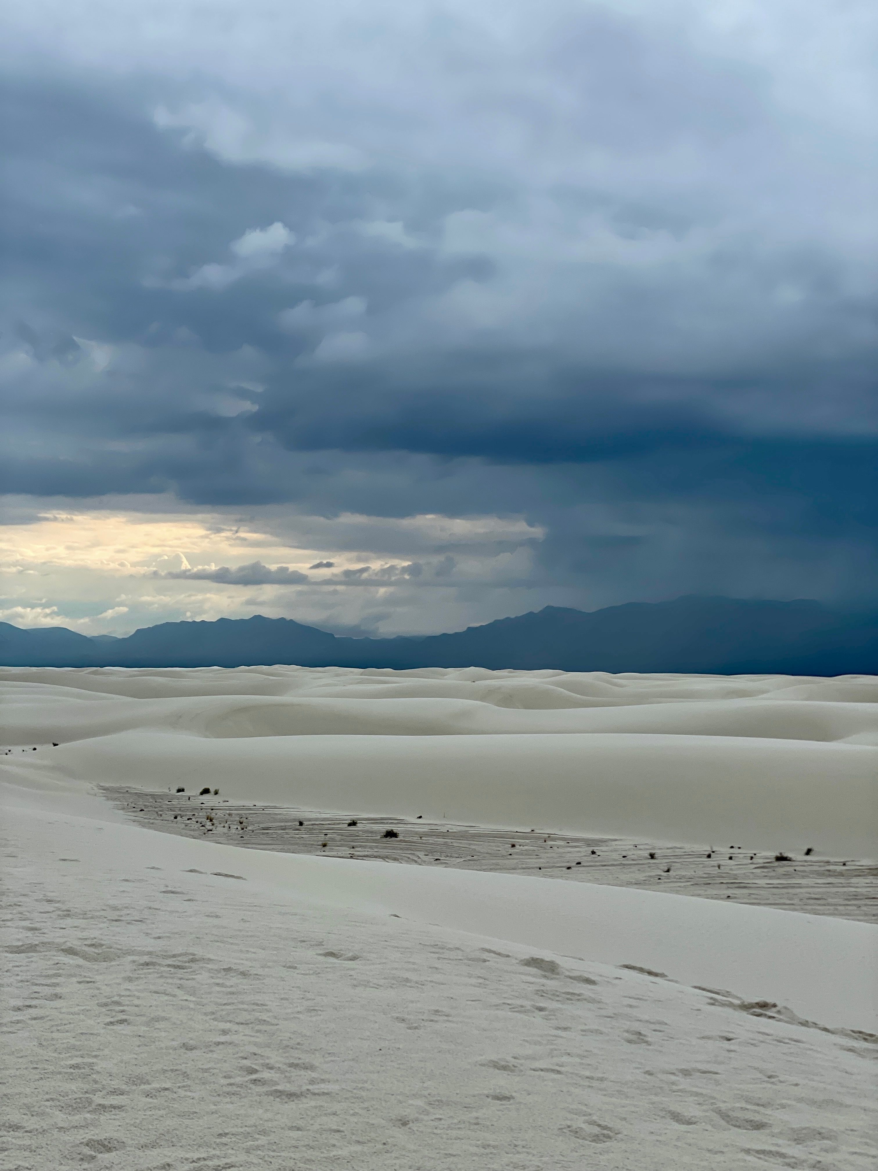 Storm Clouds over Sandy Beach · Free Stock Photo
