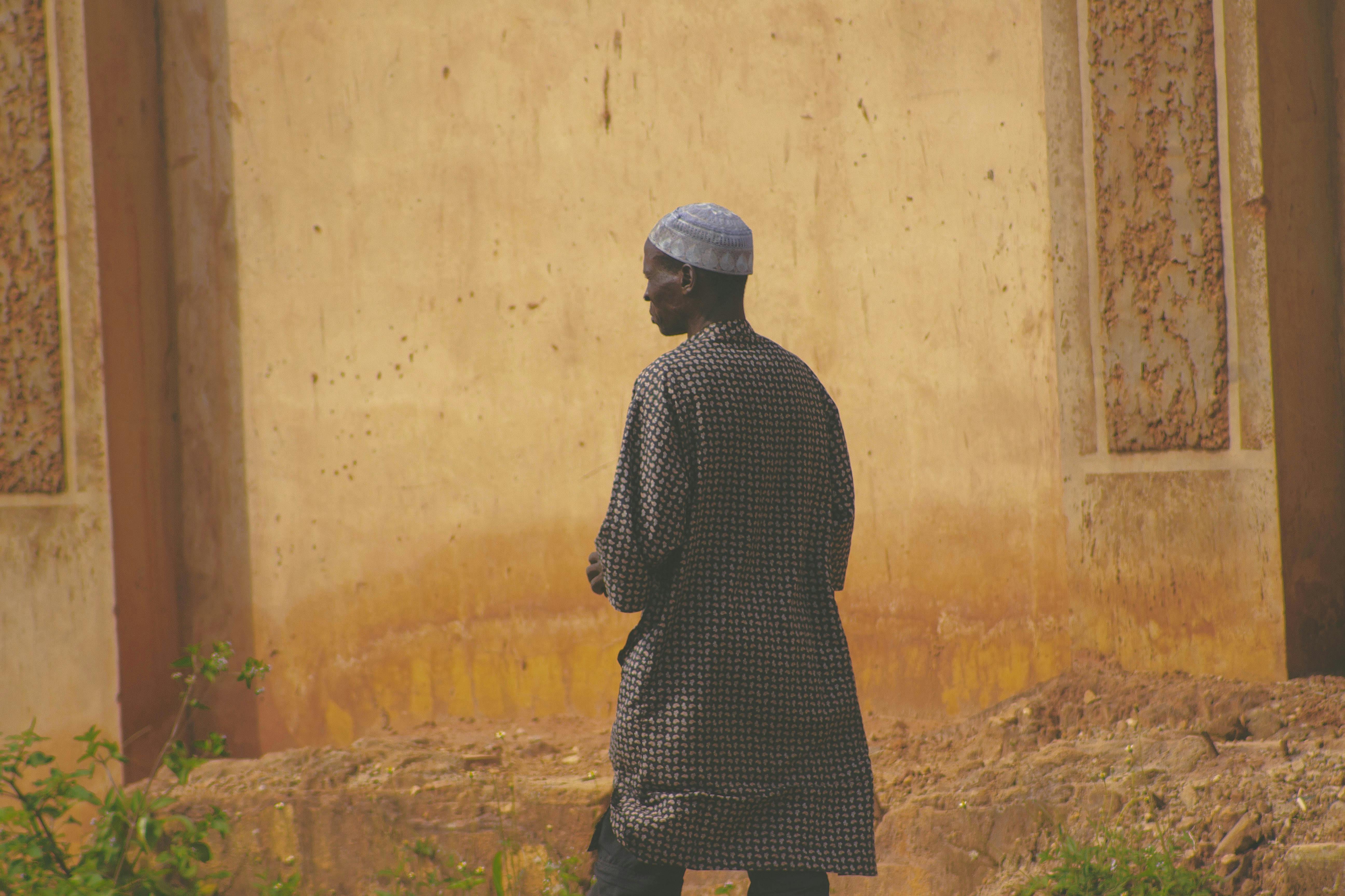 Back View of Man in Traditional Clothing · Free Stock Photo
