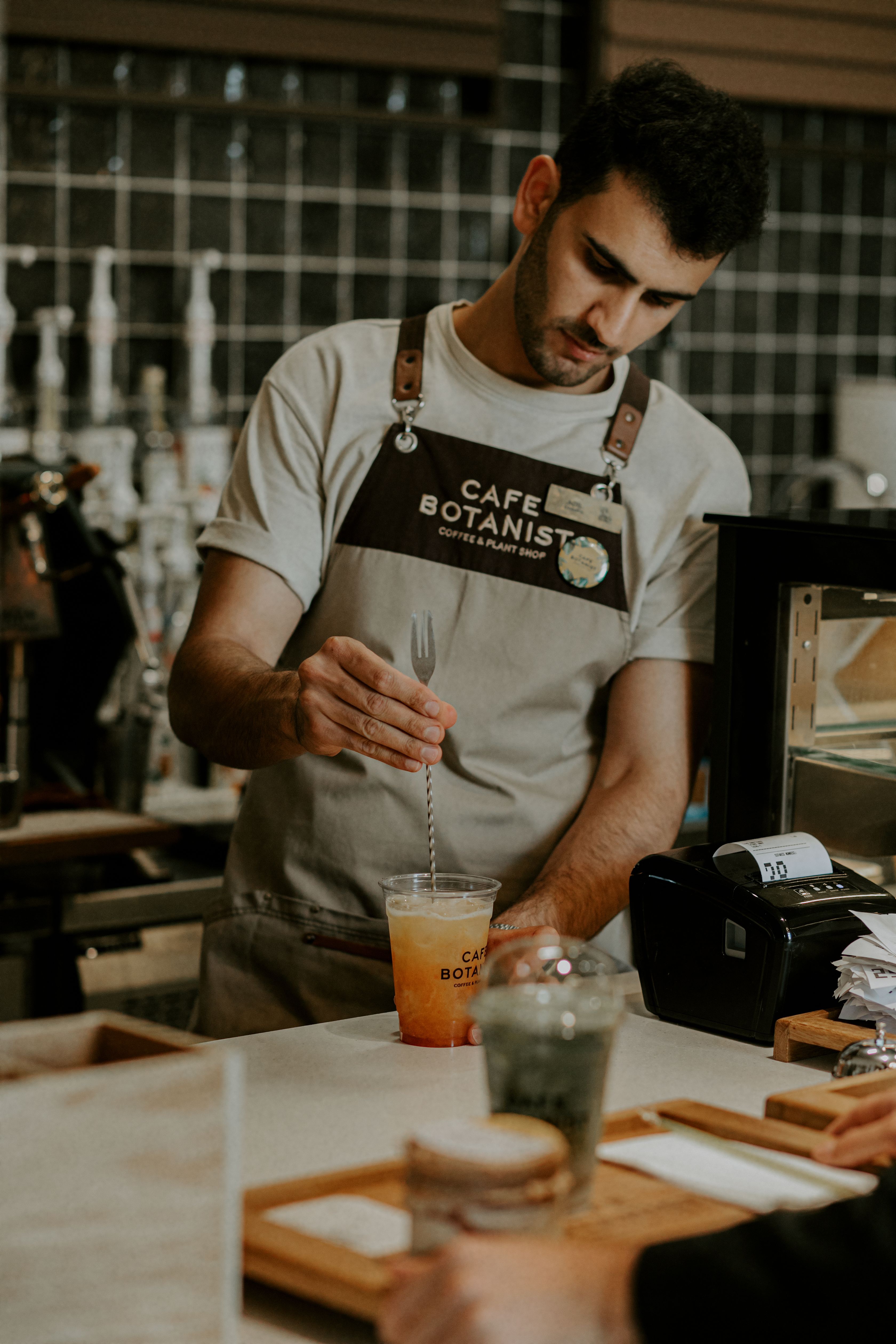 Man Working at Cafe · Free Stock Photo