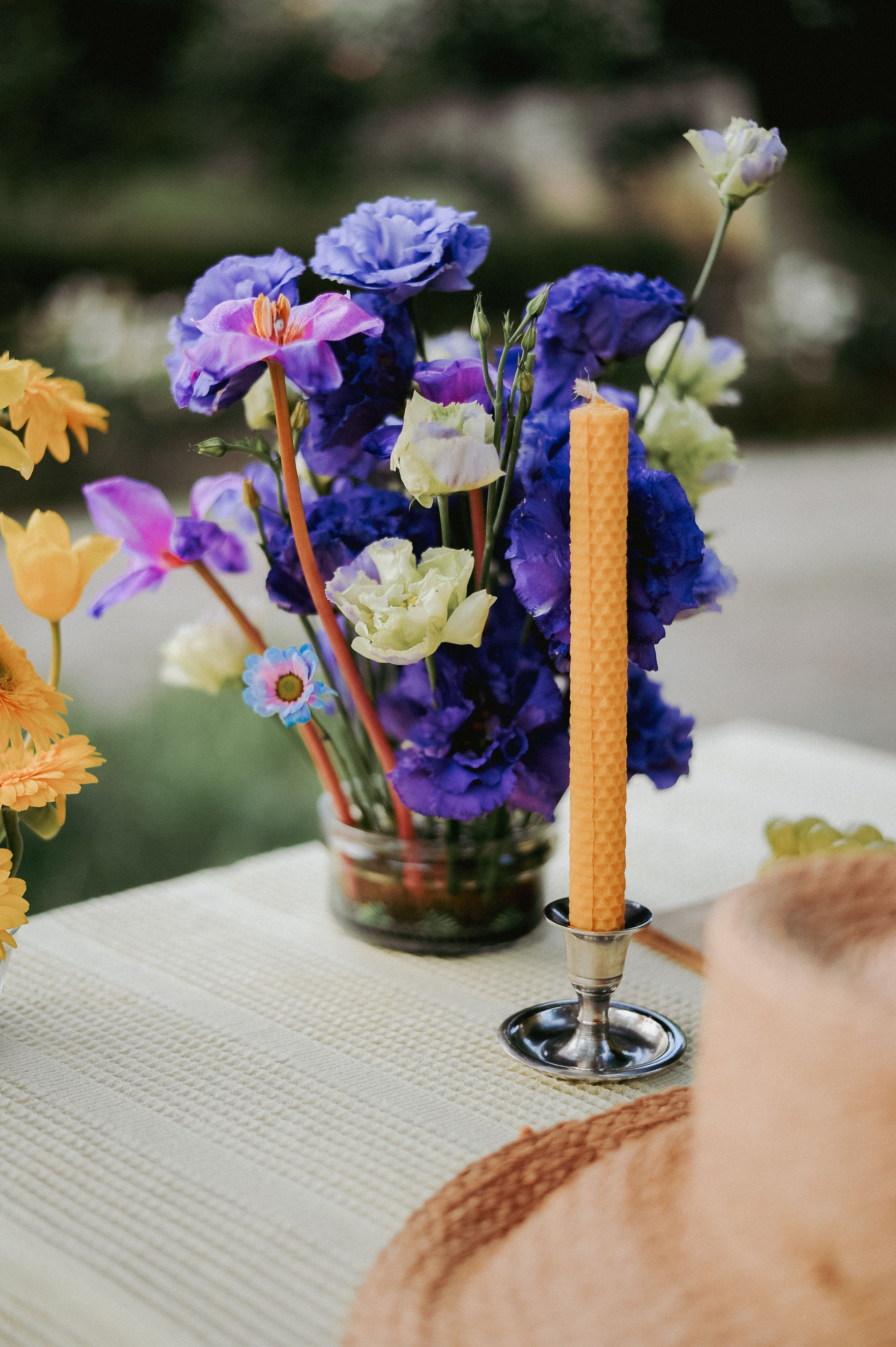Close-up of a Table in the Garden Decorated with Flowers and Candles ...