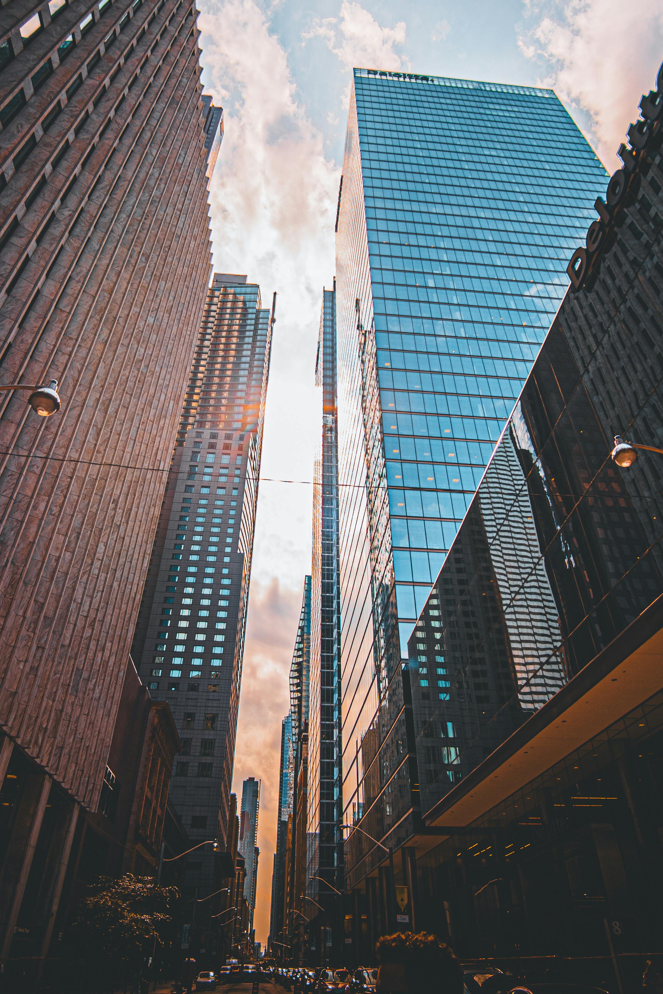 Woman Standing Next to Building · Free Stock Photo