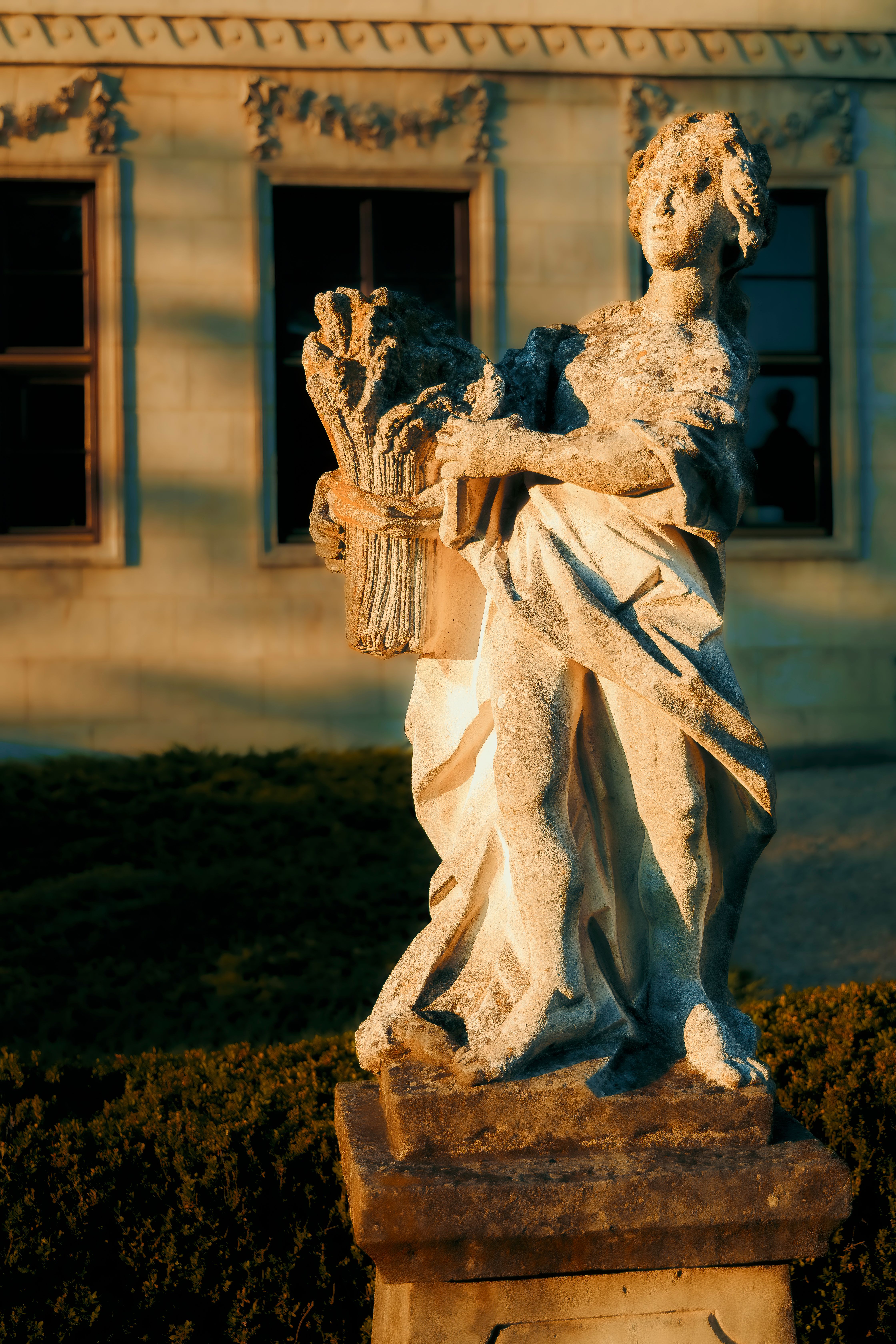 Statues of Woman with Basket · Free Stock Photo