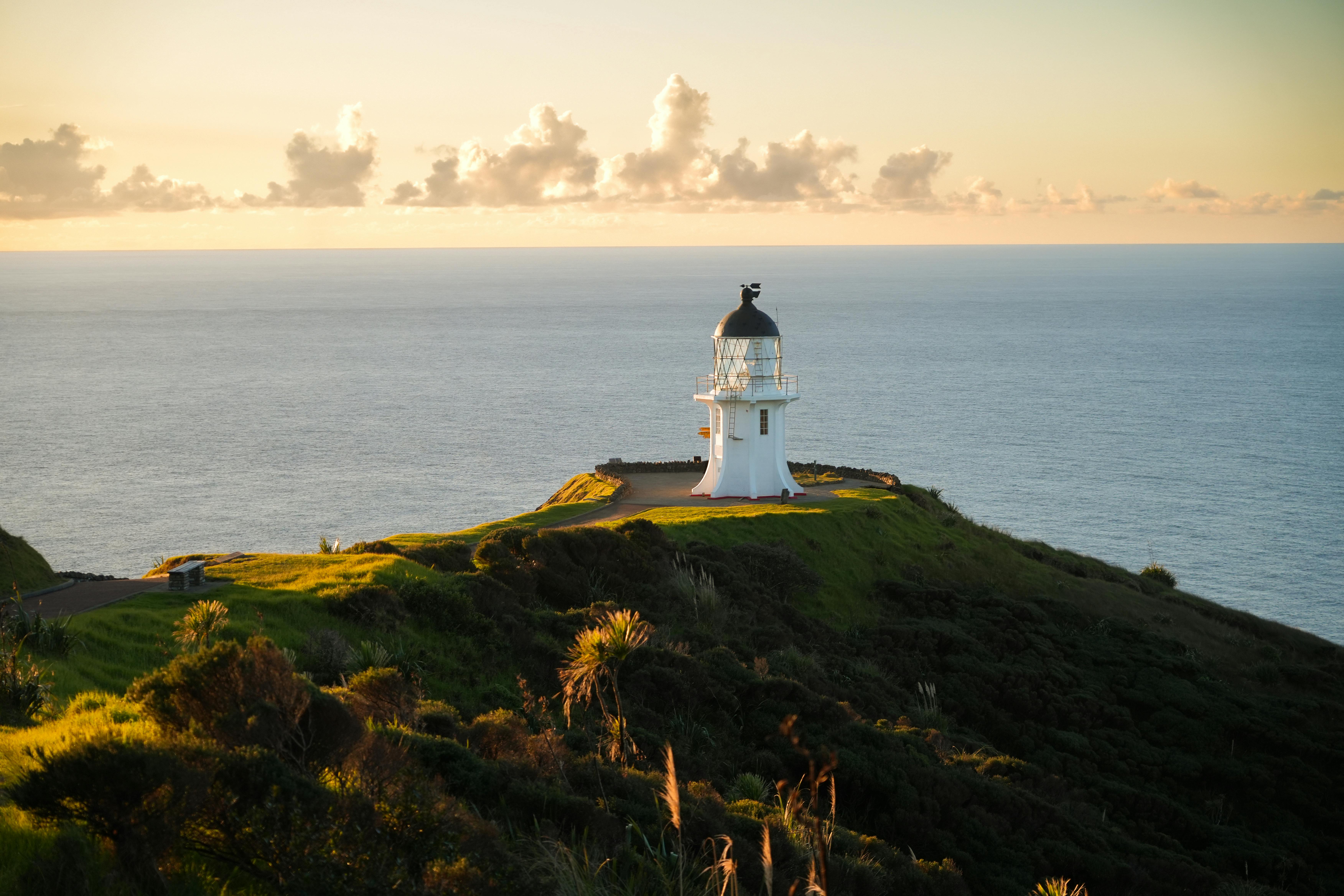 Cape Reinga Lighthouse at Sunset, North Island, New Zealand · Free ...