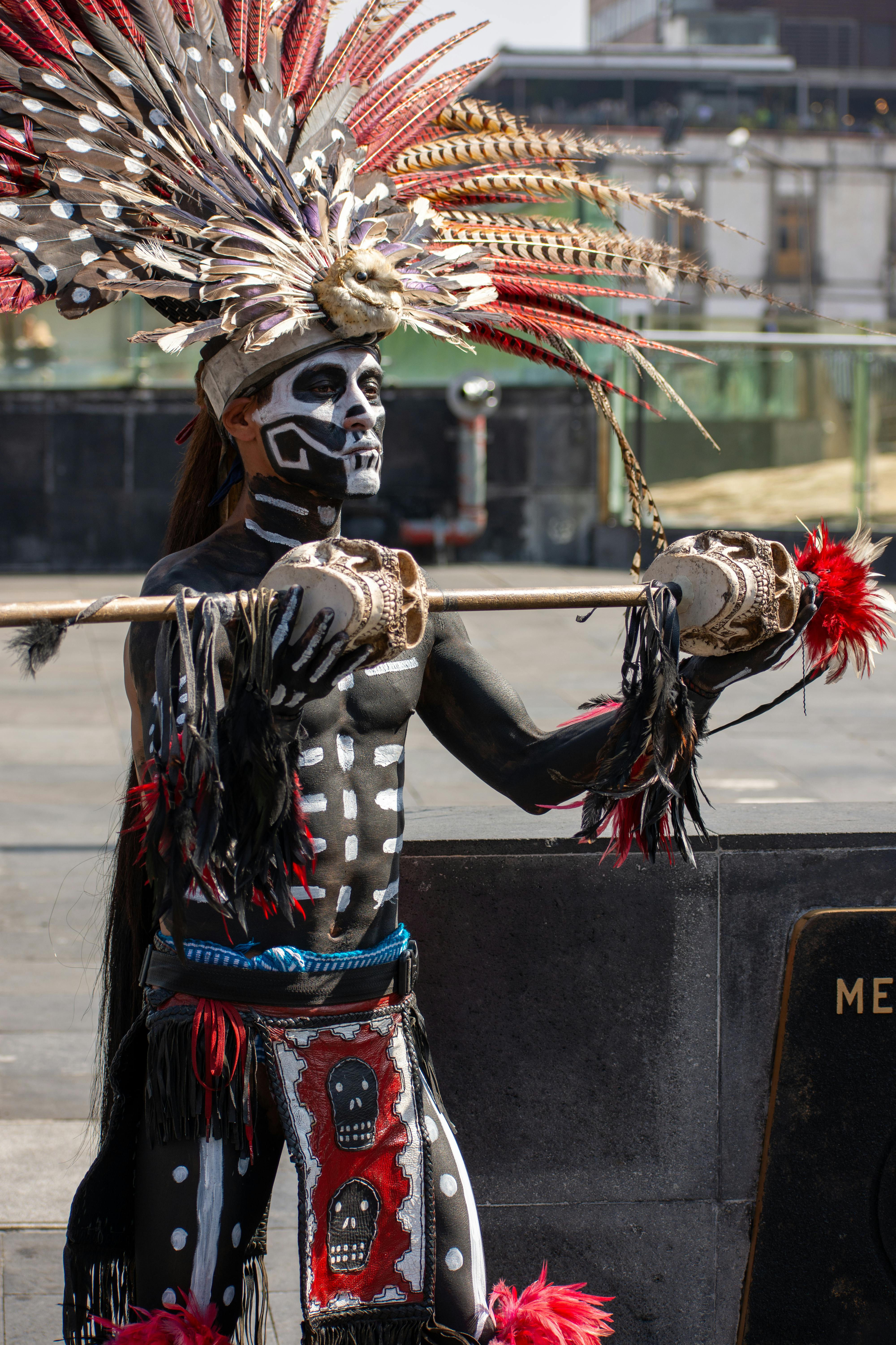Man Wearing a Traditional Aztec Warrior Costume · Free Stock Photo