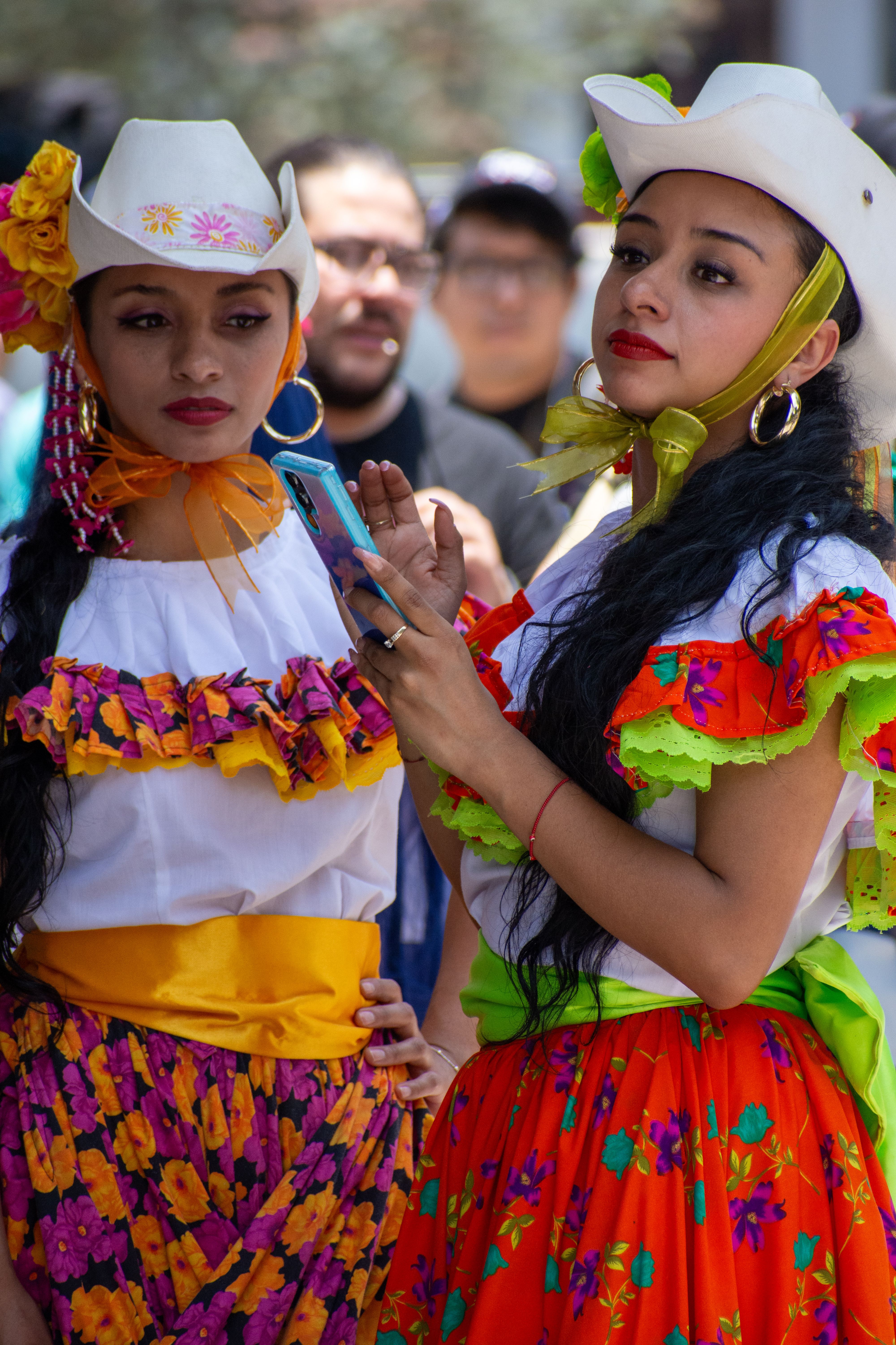 Women in Folklore Dresses and Hats · Free Stock Photo