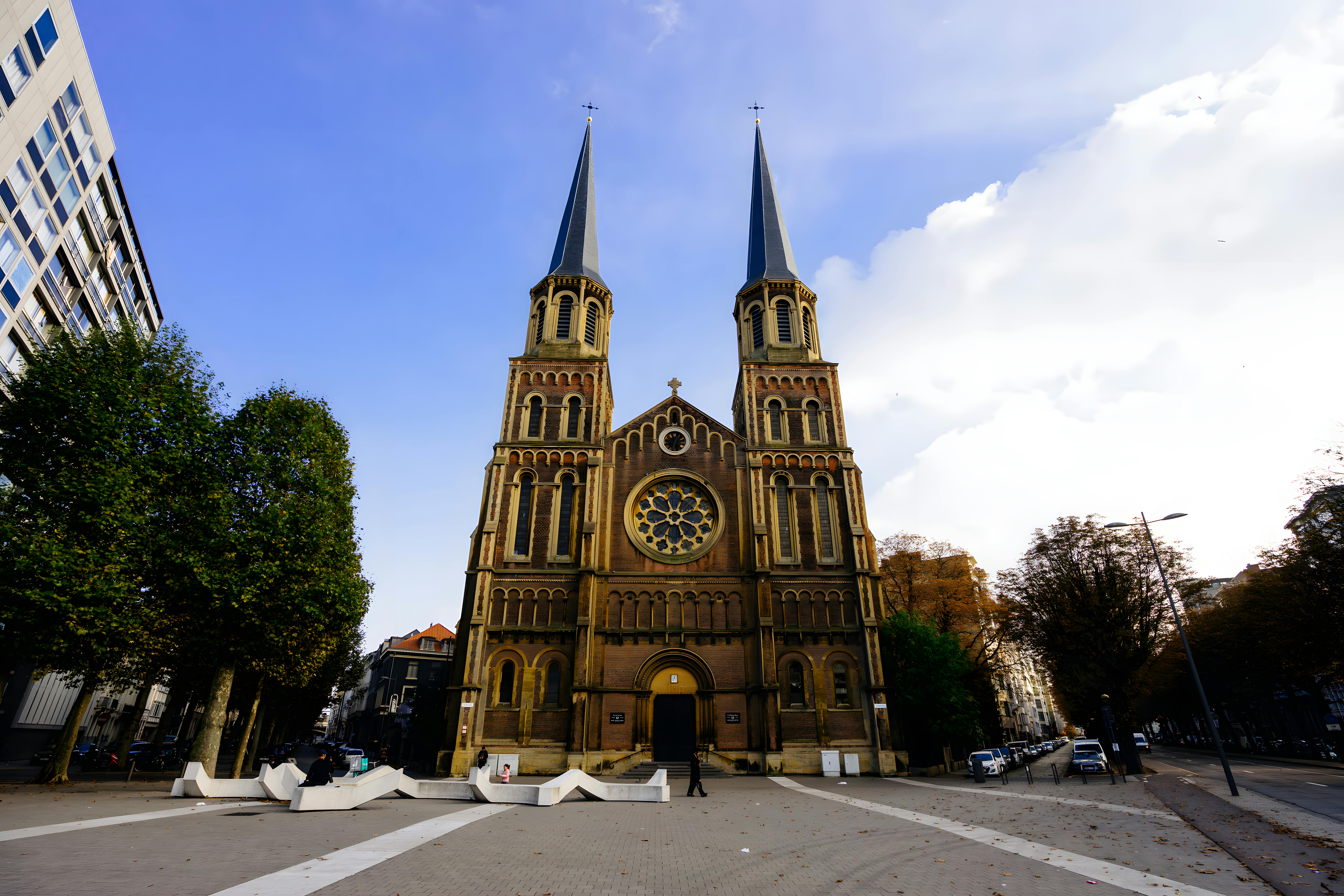 A large cathedral with two spires in the sky · Free Stock Photo