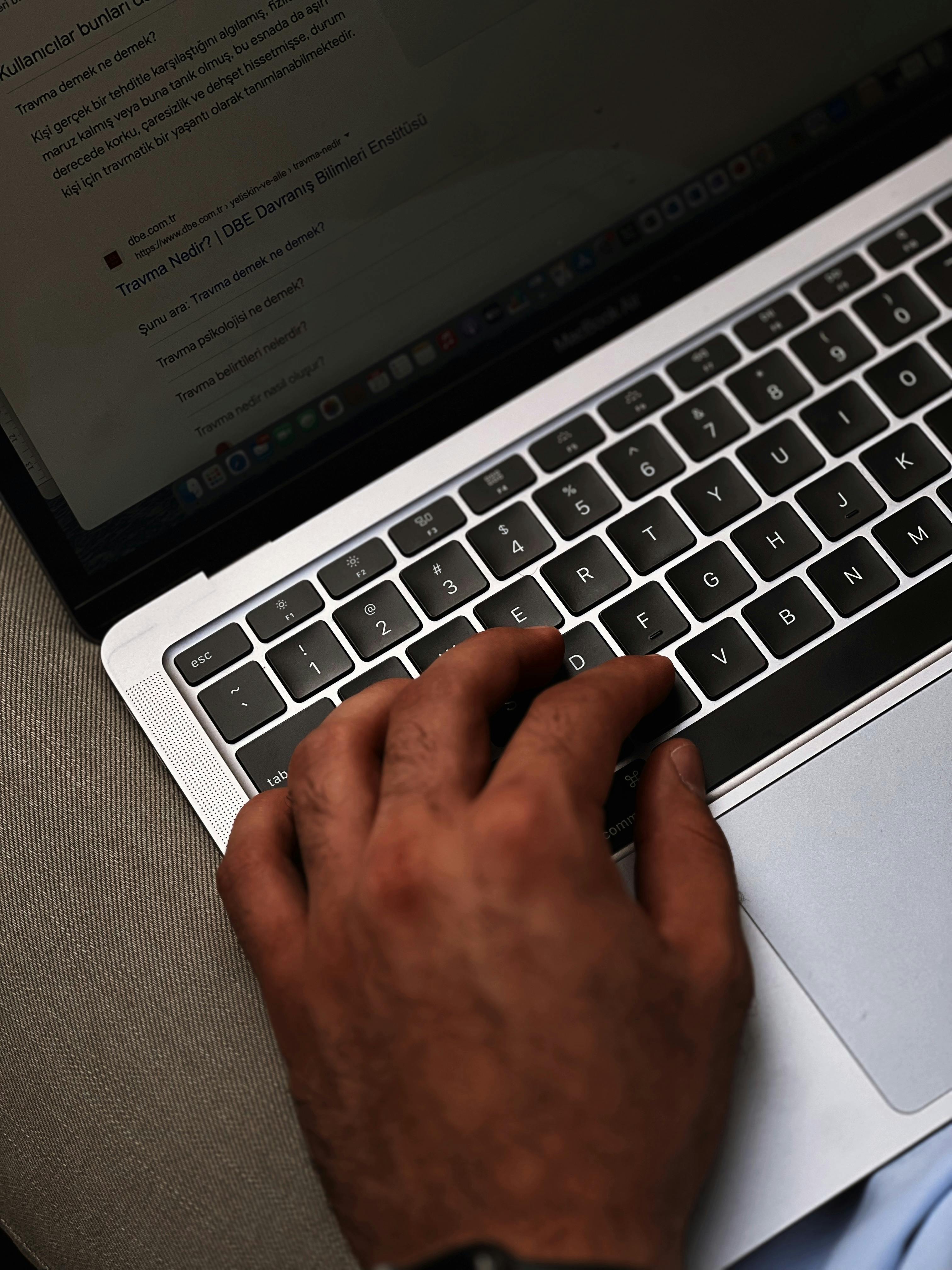 Close-Up Photo of Woman Using Laptop · Free Stock Photo