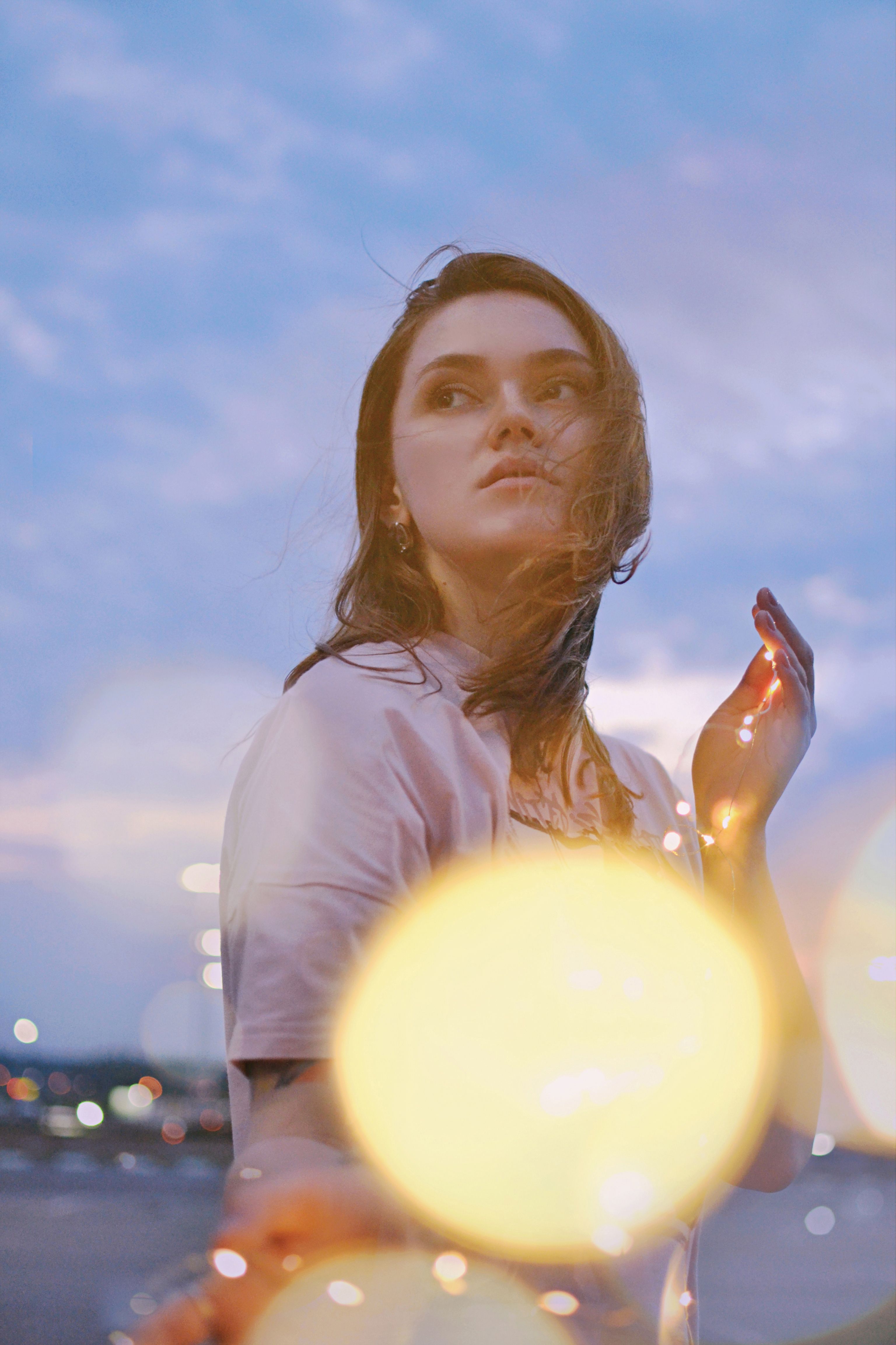 Lens Flare Overlapped on Woman Portrait · Free Stock Photo