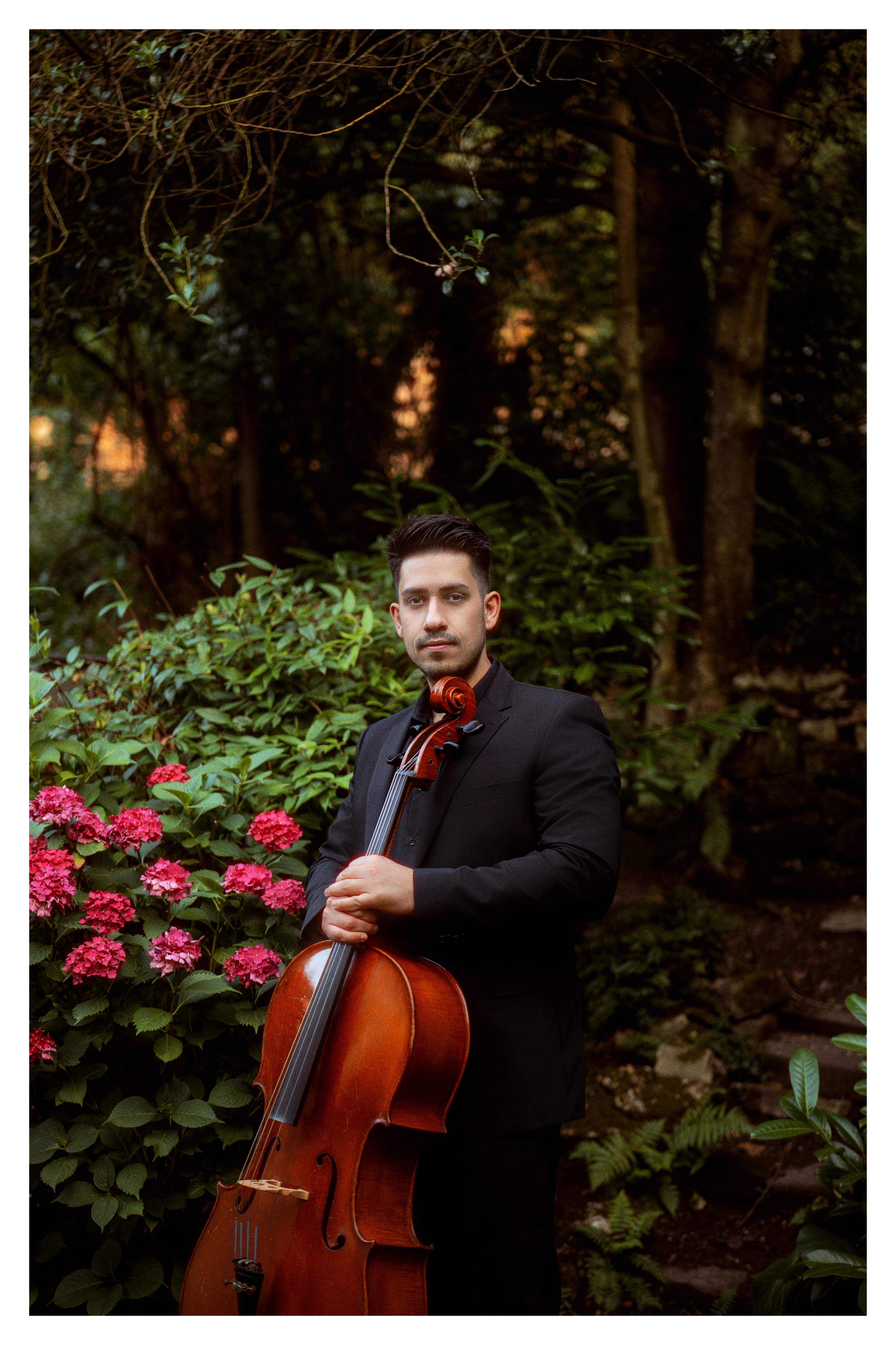 Handsome Musician with Cello in Garden · Free Stock Photo