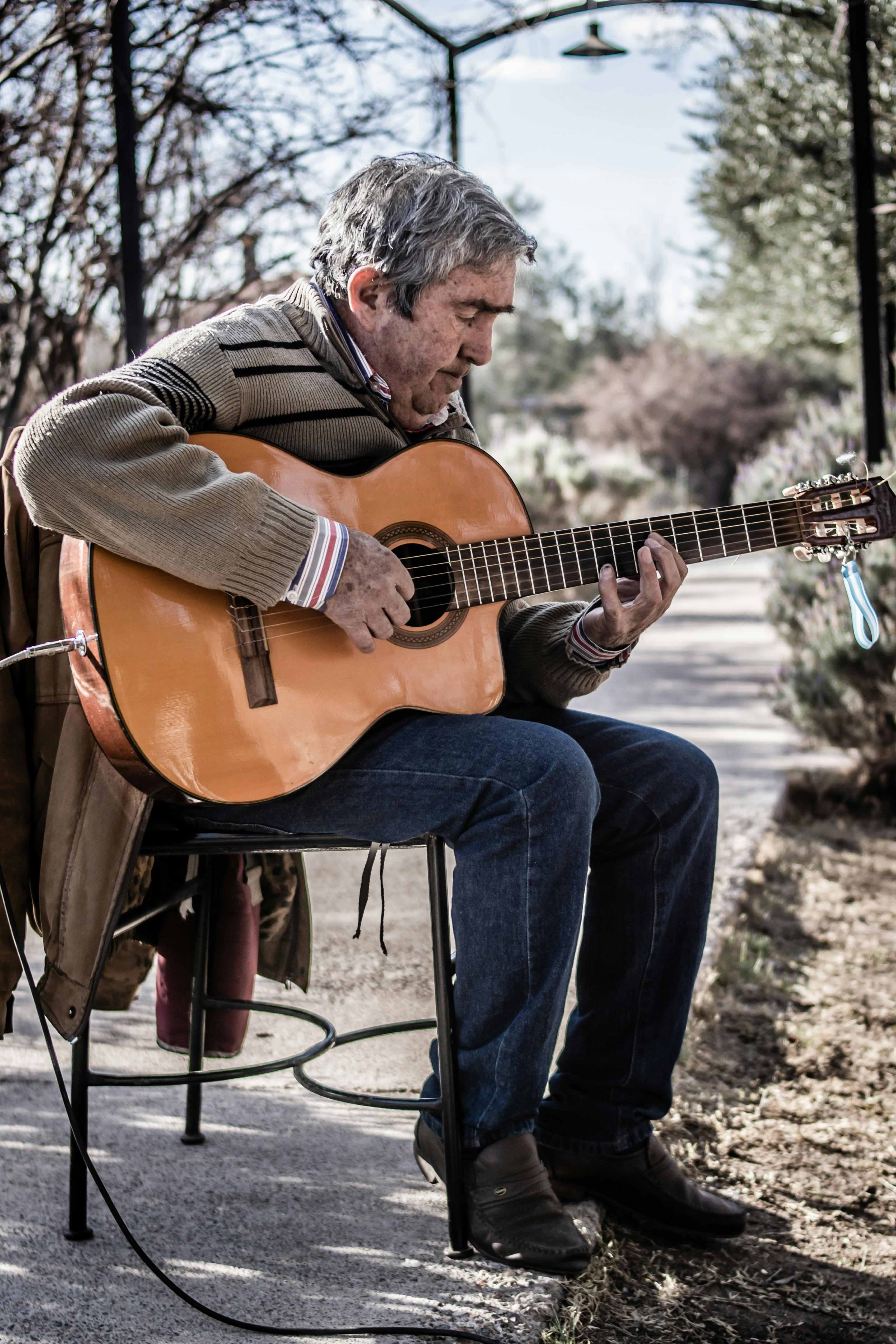 Old Man Playing Guitar in Park · Free Stock Photo