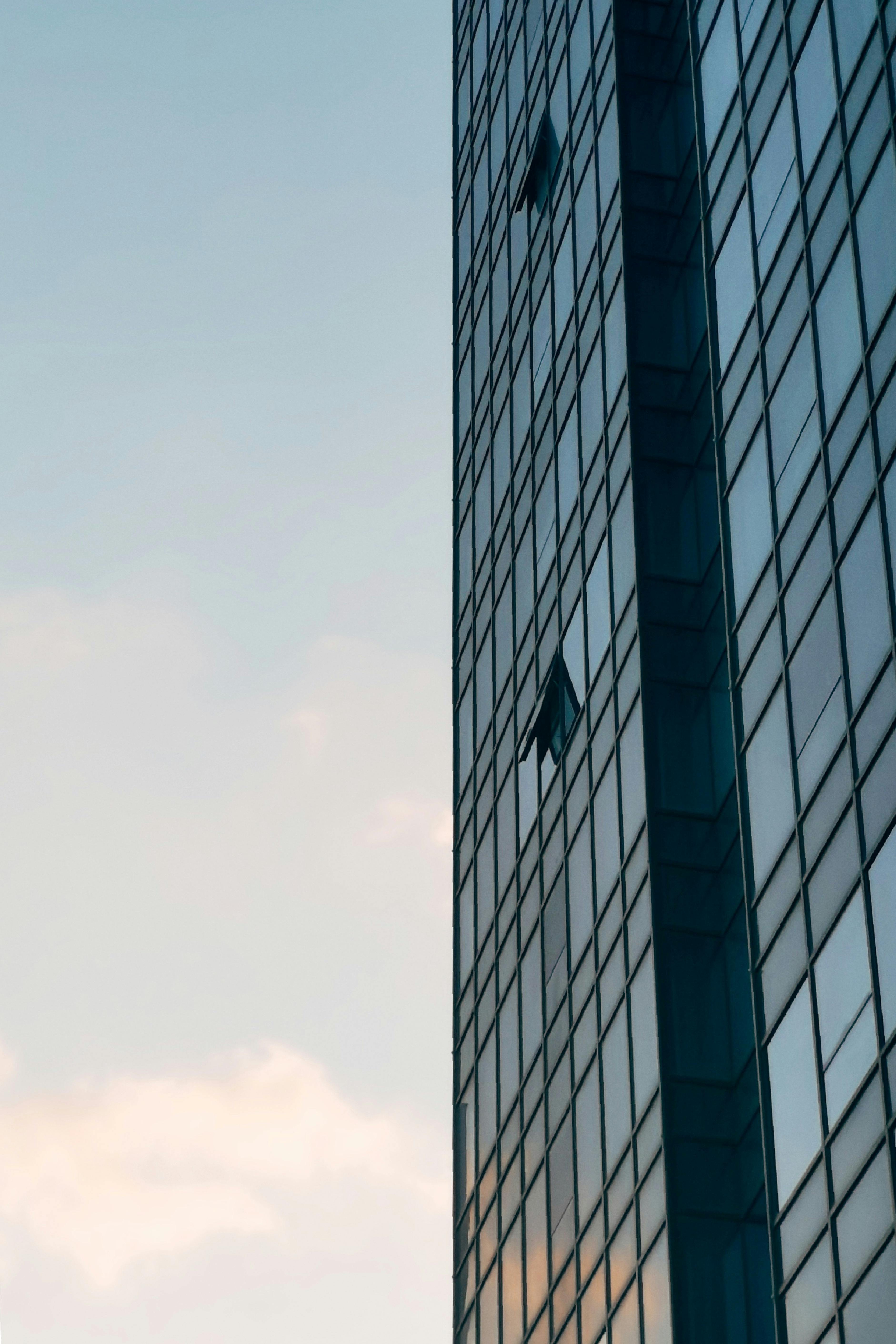 Modern Skyscraper with a Glass Facade · Free Stock Photo
