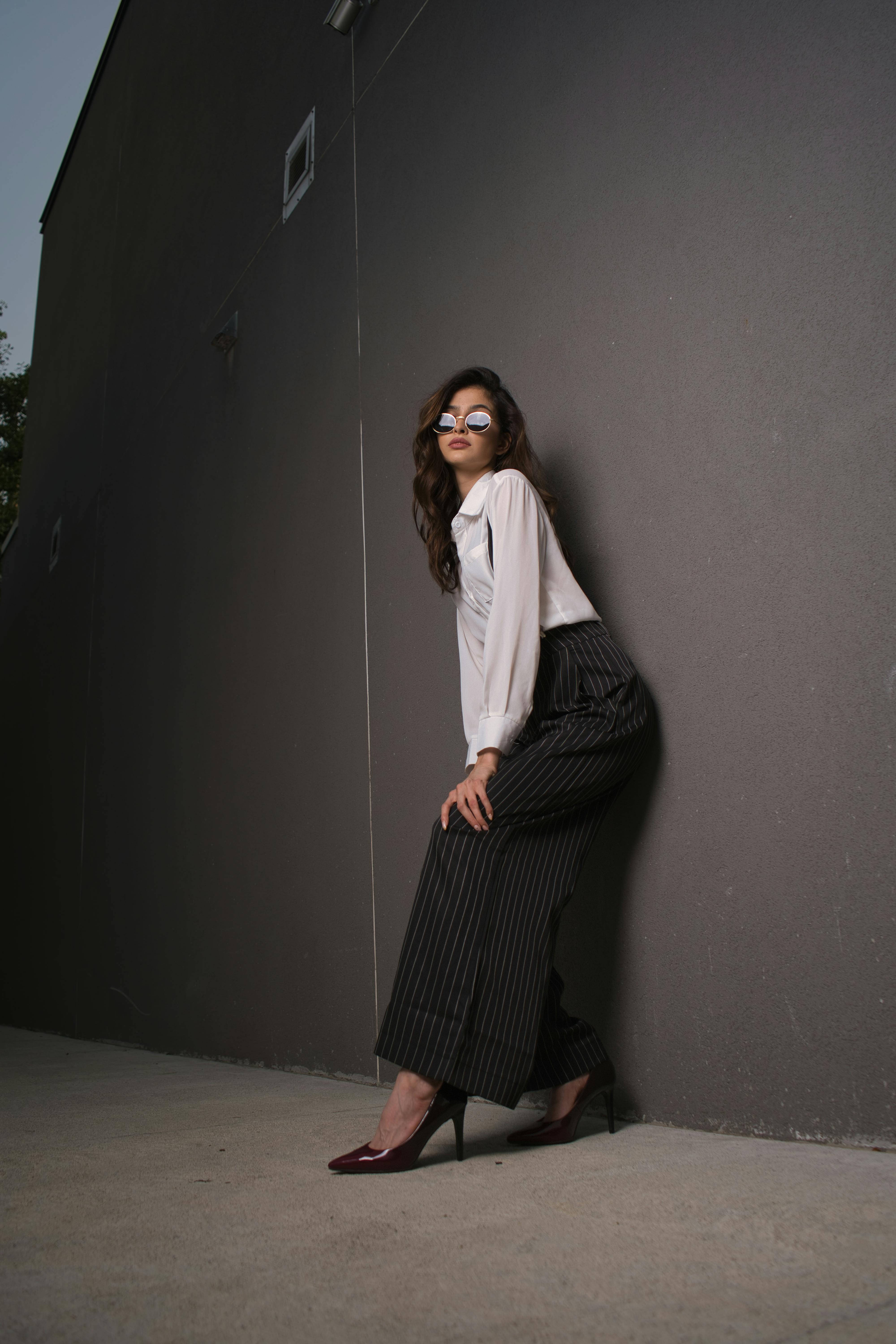 Girl Leaning Against Wall In Profile Photos, Download The BEST Free ...