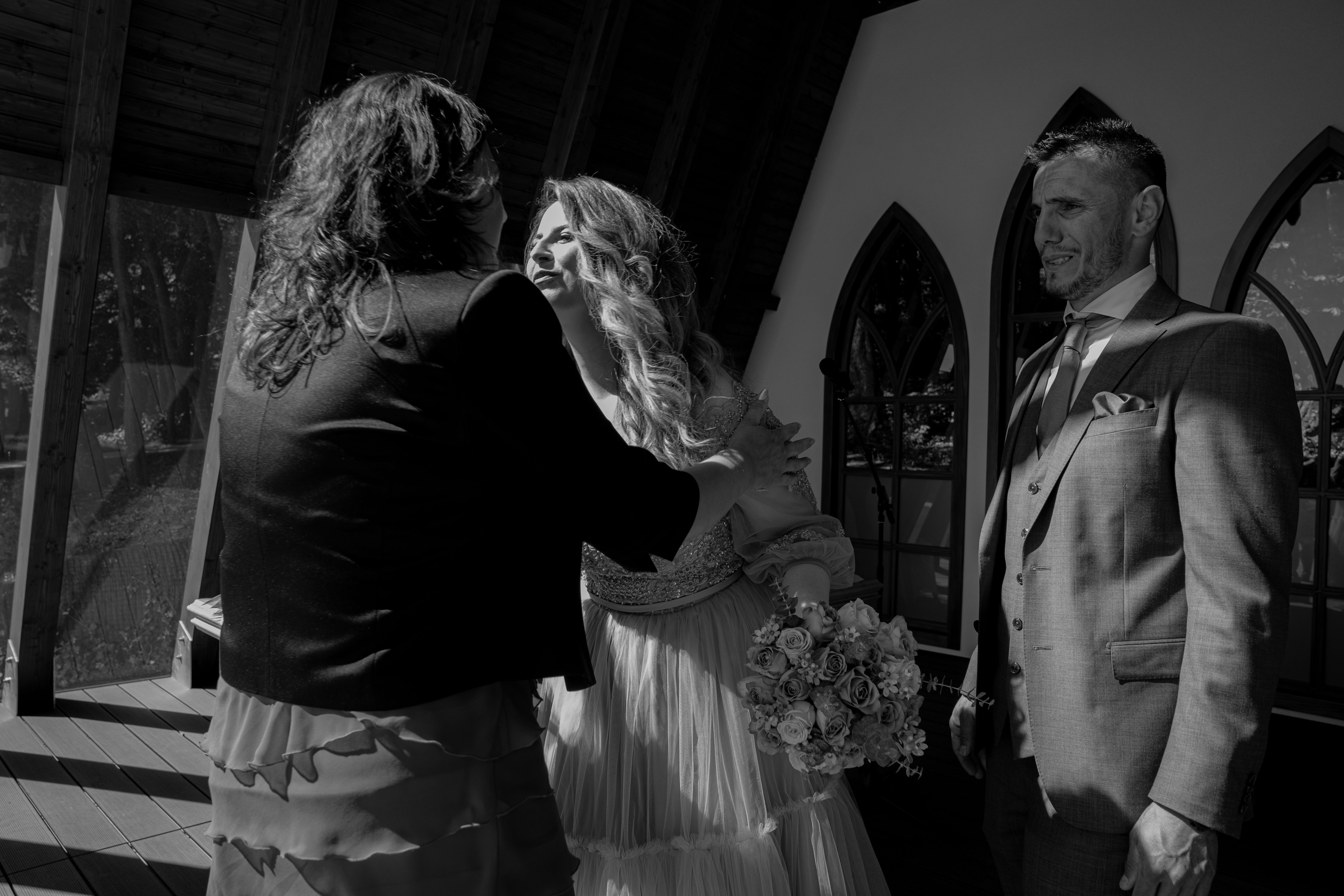 Bridegroom Embracing Bride from Behind · Free Stock Photo