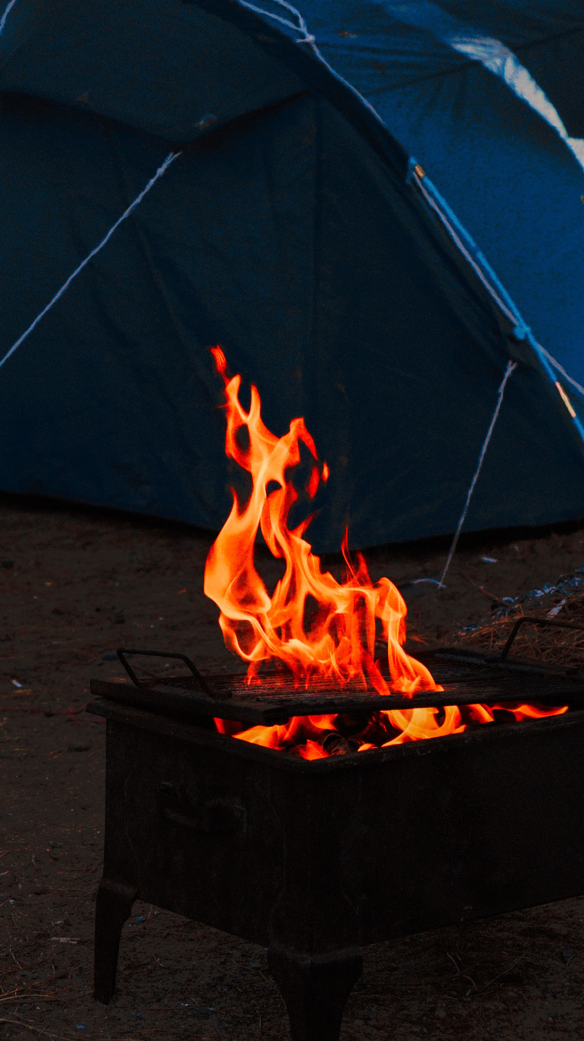 A Bonfire and a Tent on a Campsite · Free Stock Photo