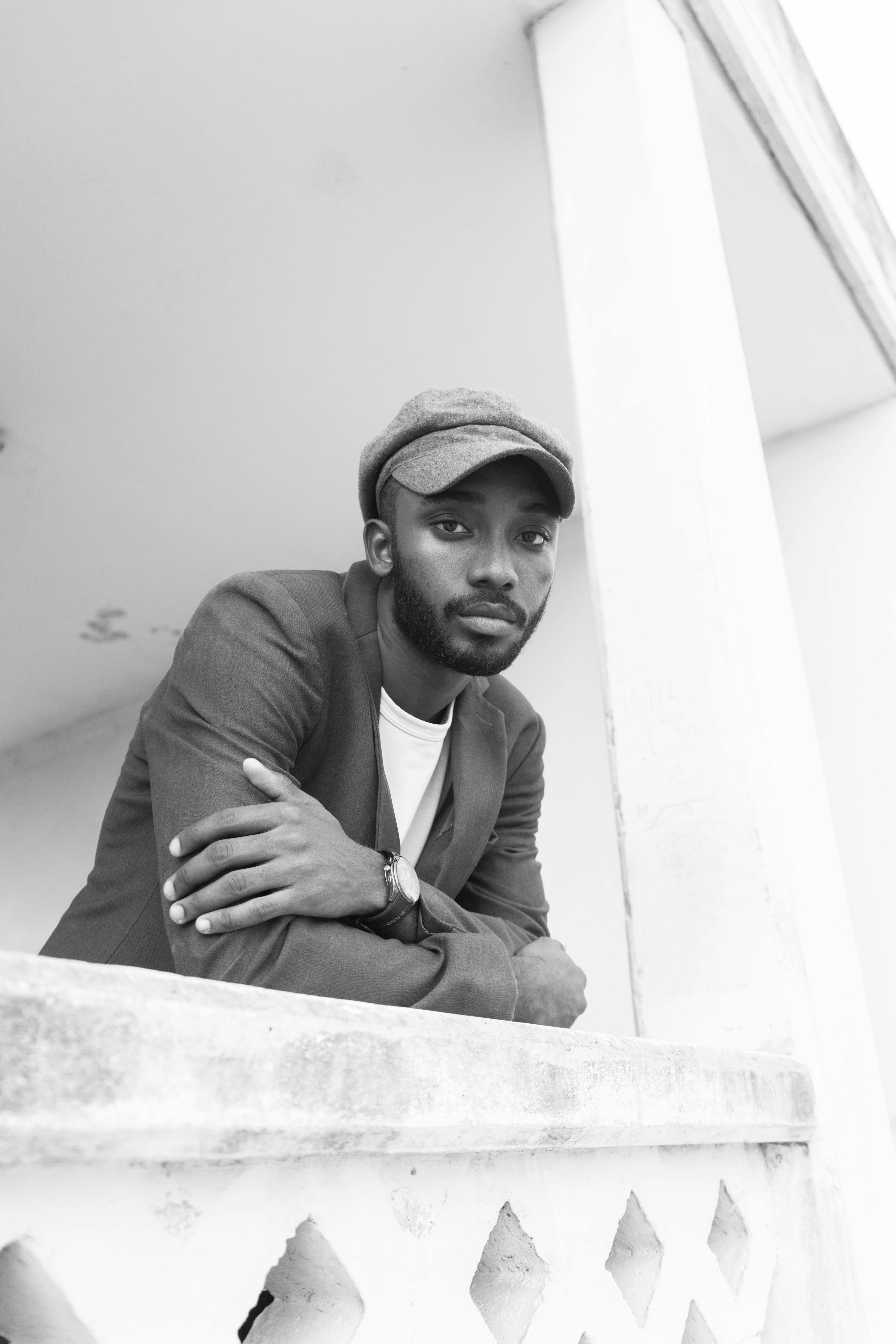 Man in Cap and Suit · Free Stock Photo