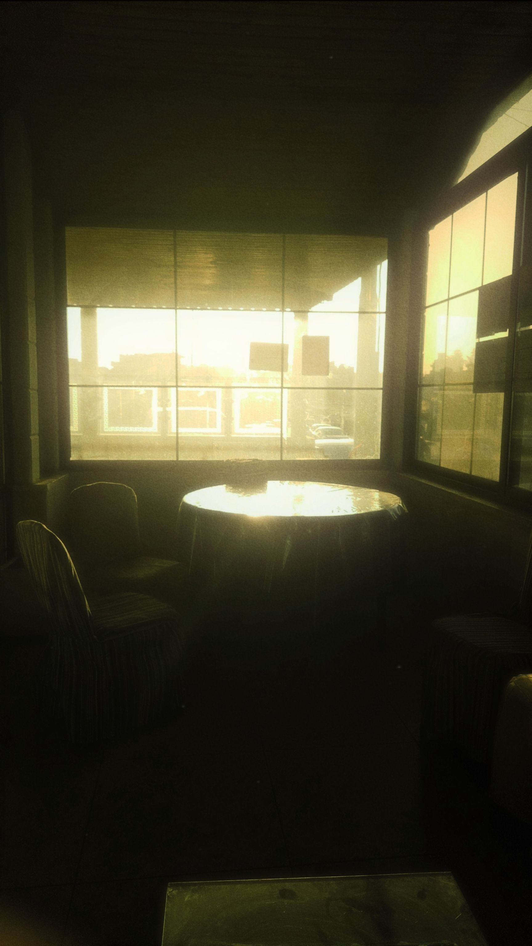 Round Table in the Corner of a Restaurant Reflecting Sunlight · Free ...