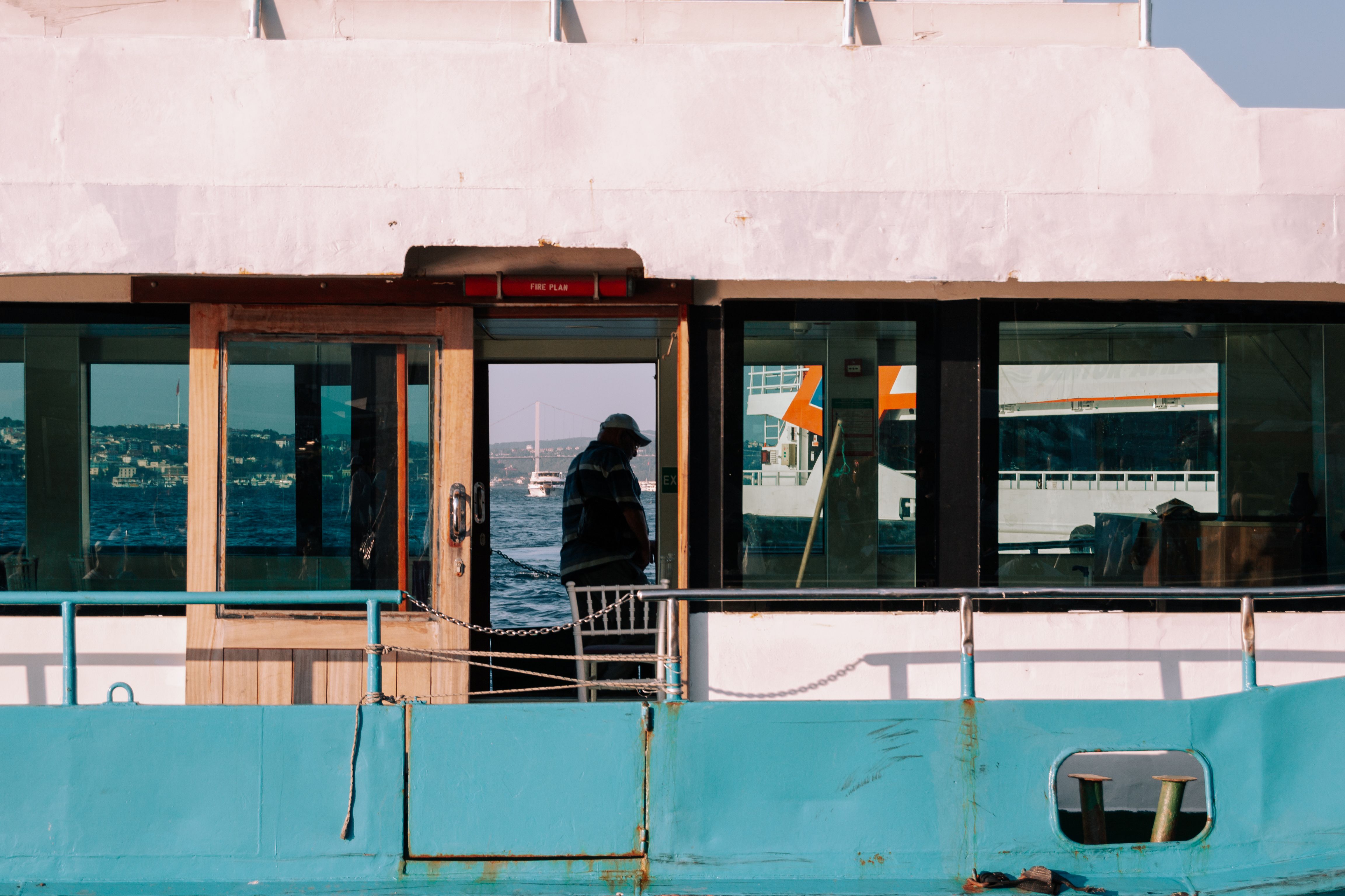 Photo of a Man on a Ferry · Free Stock Photo