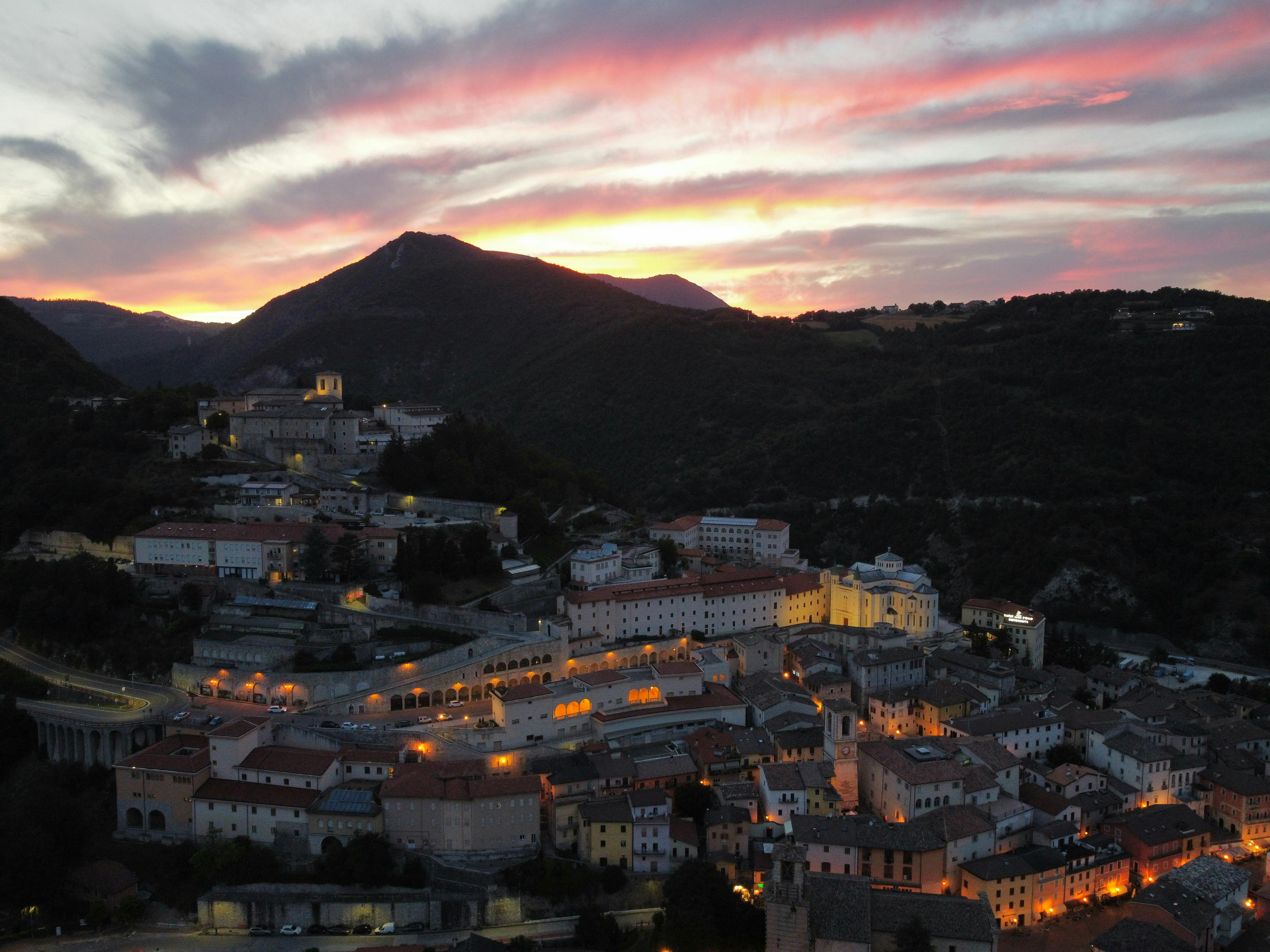 Aerial View of a Town in the Valley at Sunset · Free Stock Photo
