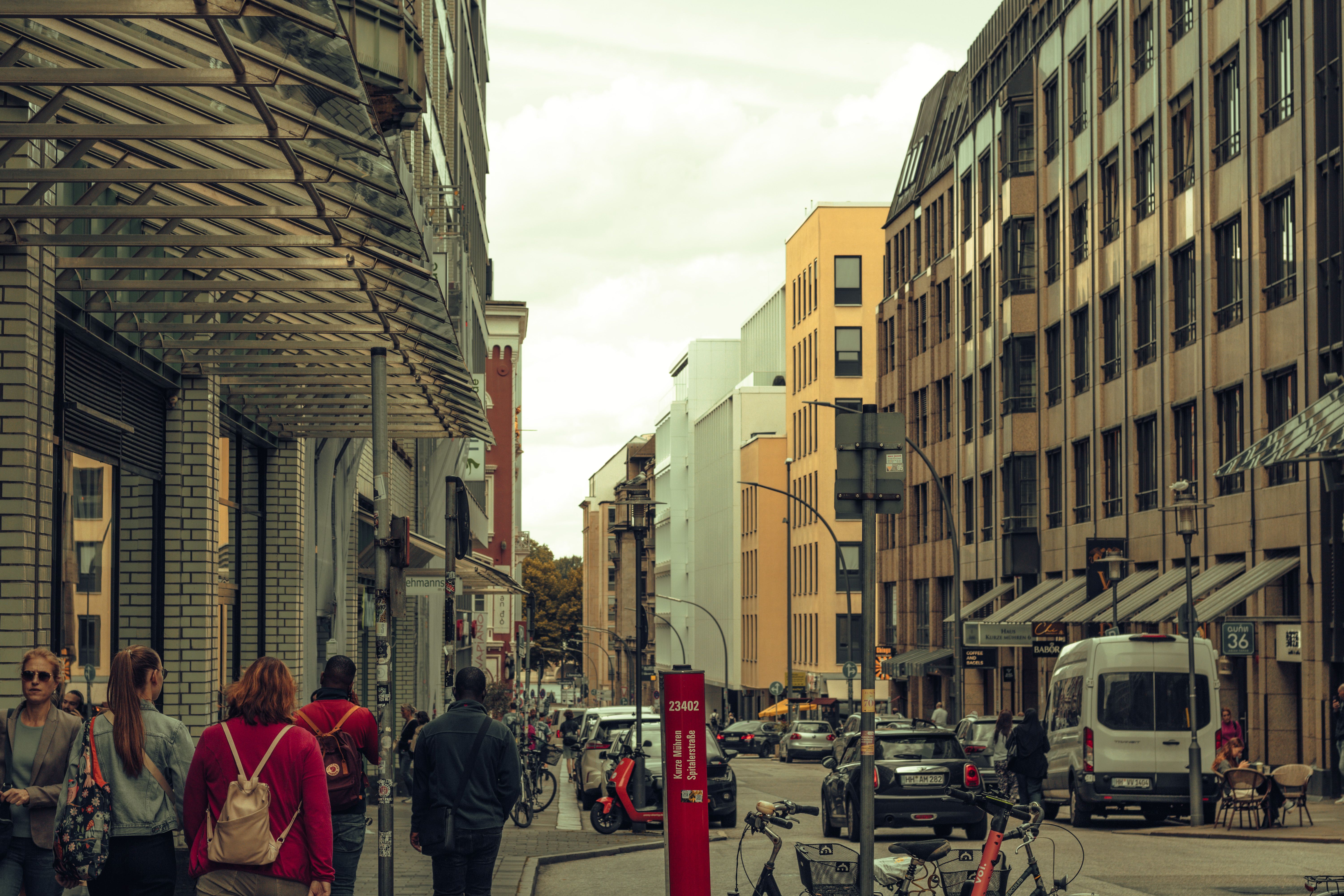 View of Pedestrians Walking on a Sidewalk in City · Free Stock Photo