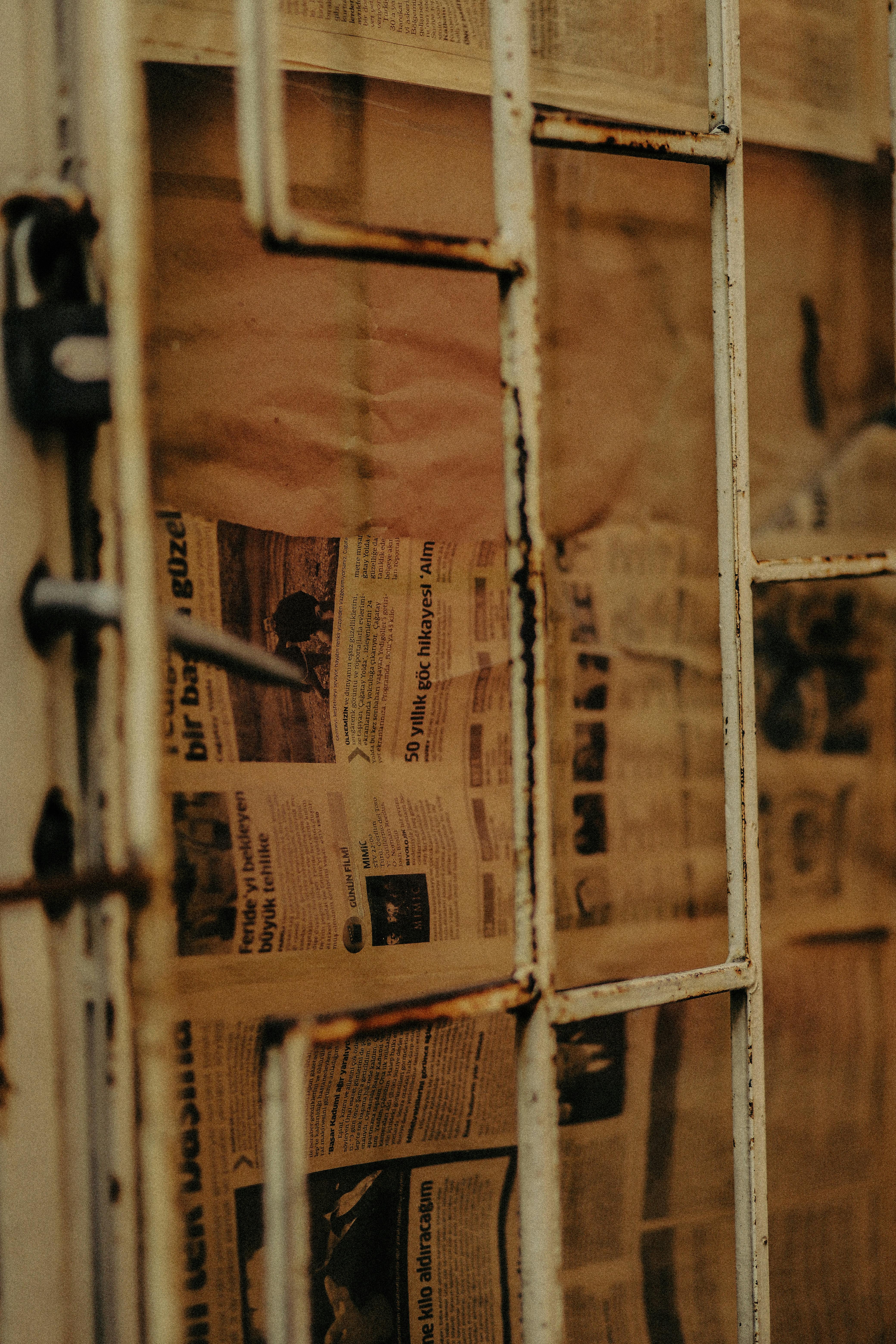 Newspaper under Hooks on Door · Free Stock Photo