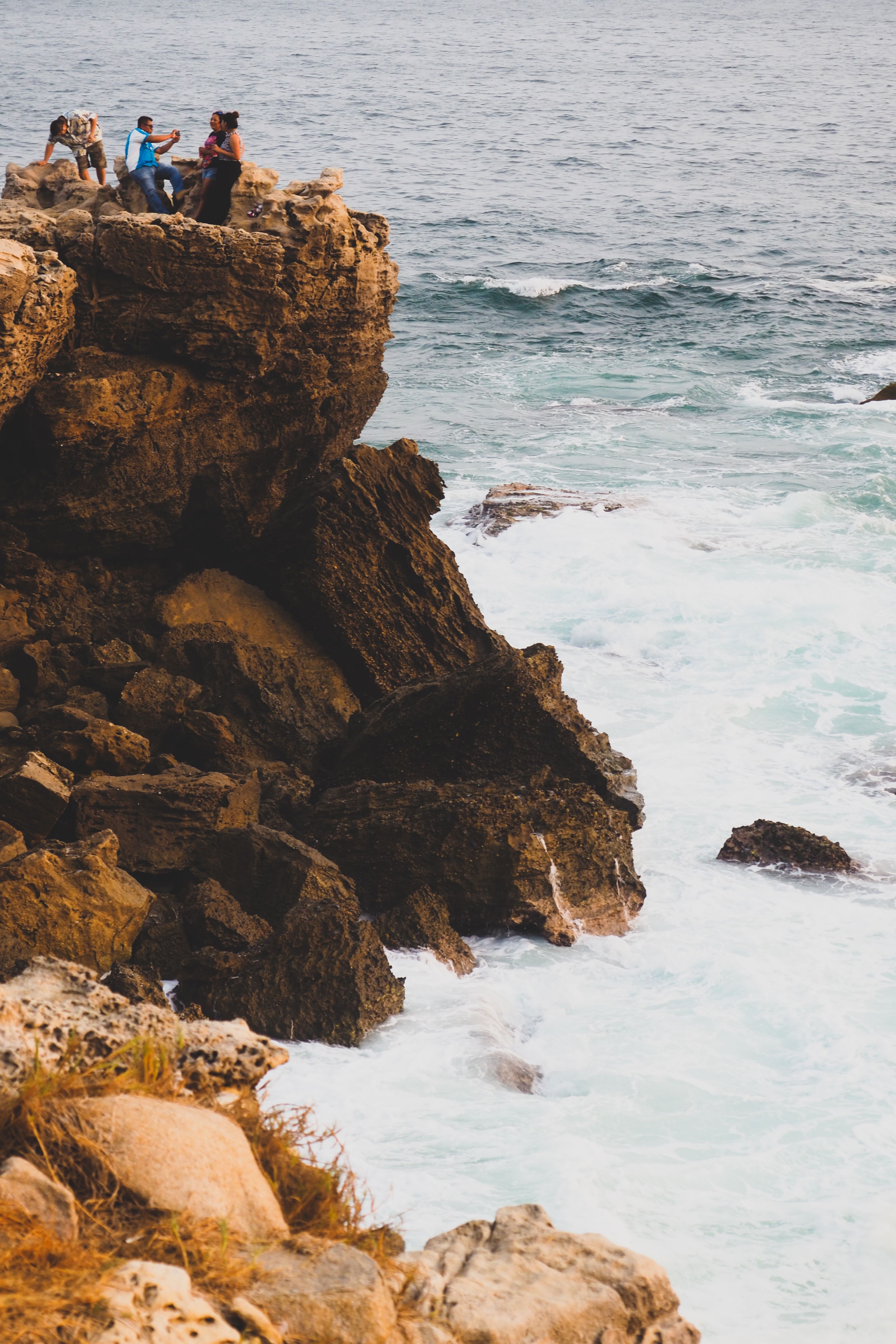 Waves Splashing against Cliff · Free Stock Photo