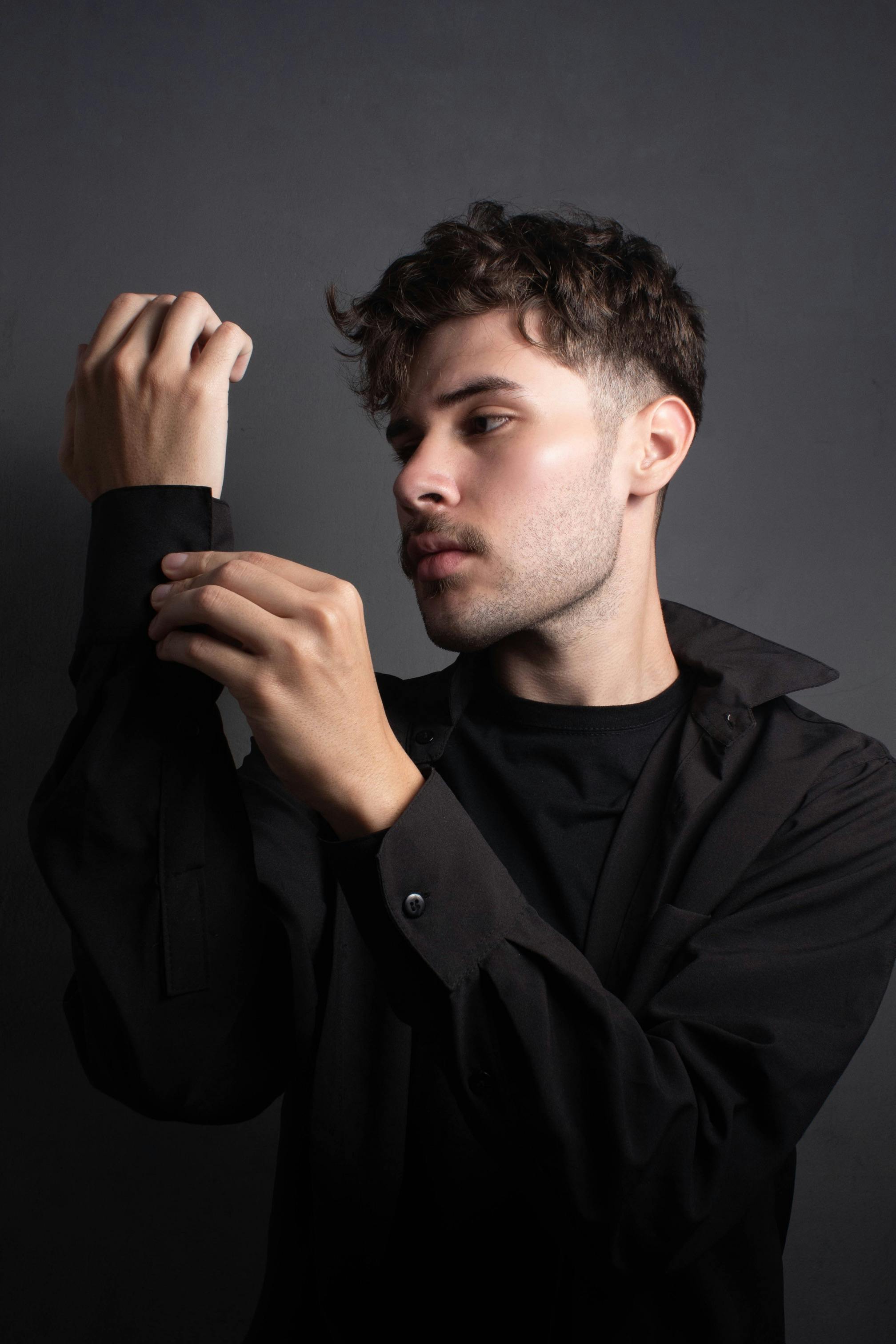 Man in Suit Looking Down · Free Stock Photo