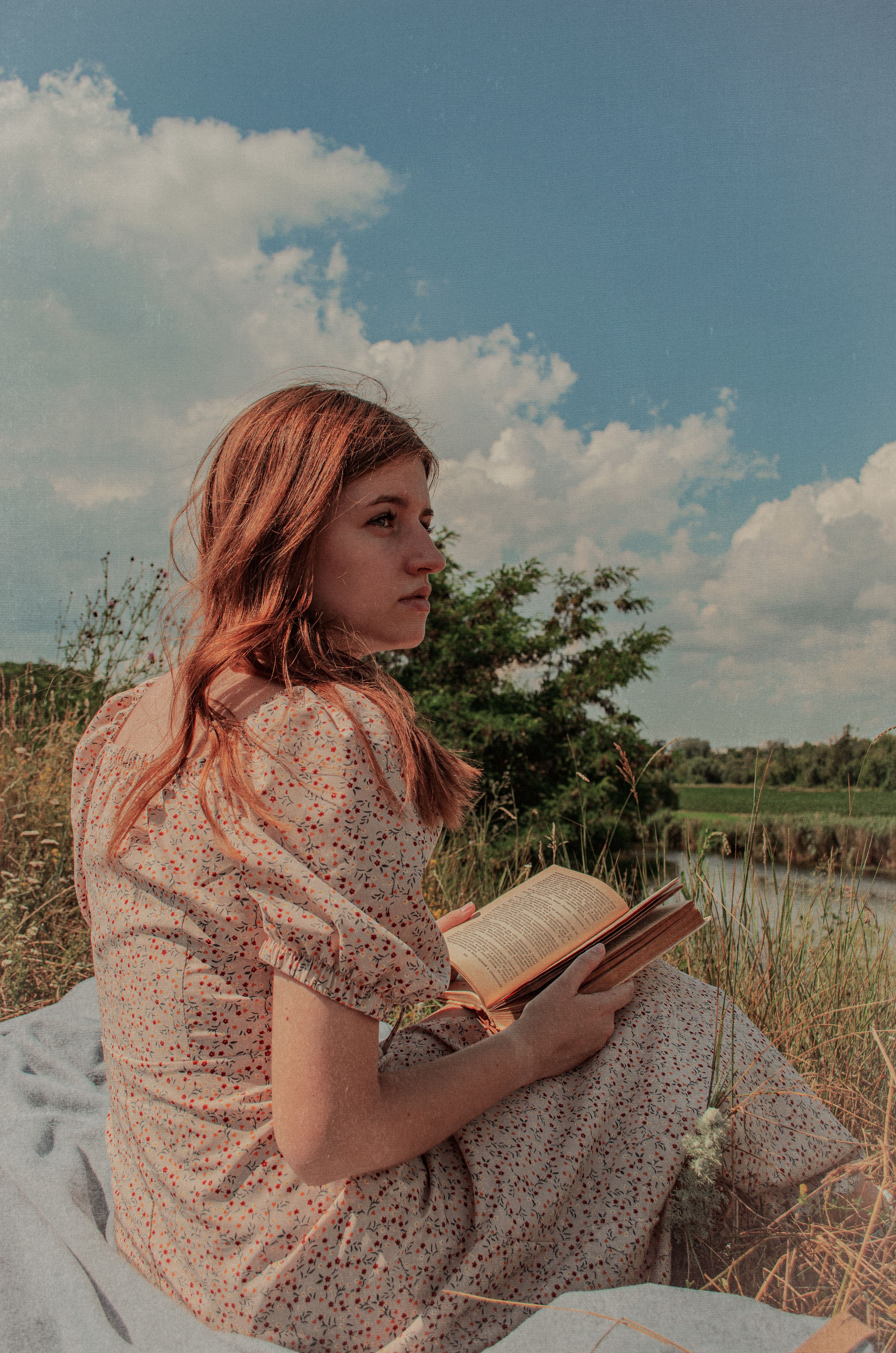 A girl in a dress reads a book retro style · Free Stock Photo