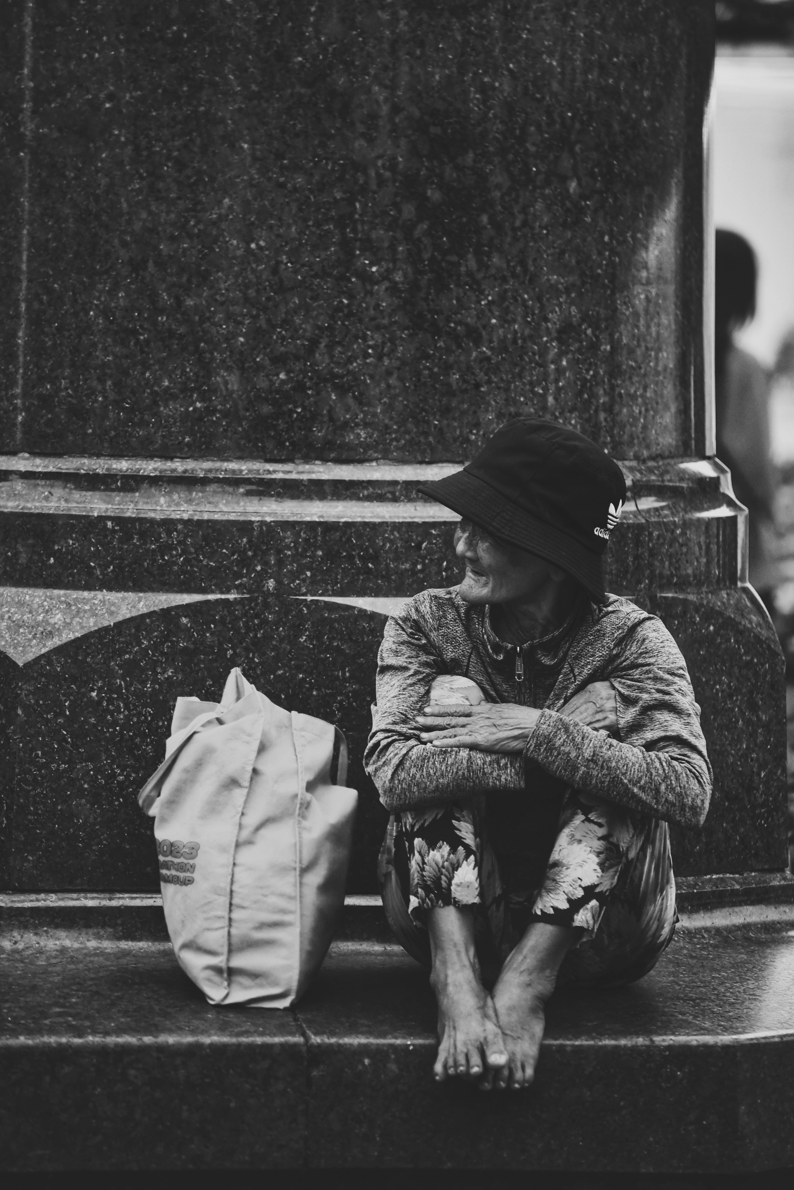 Woman Sitting in Rain · Free Stock Photo