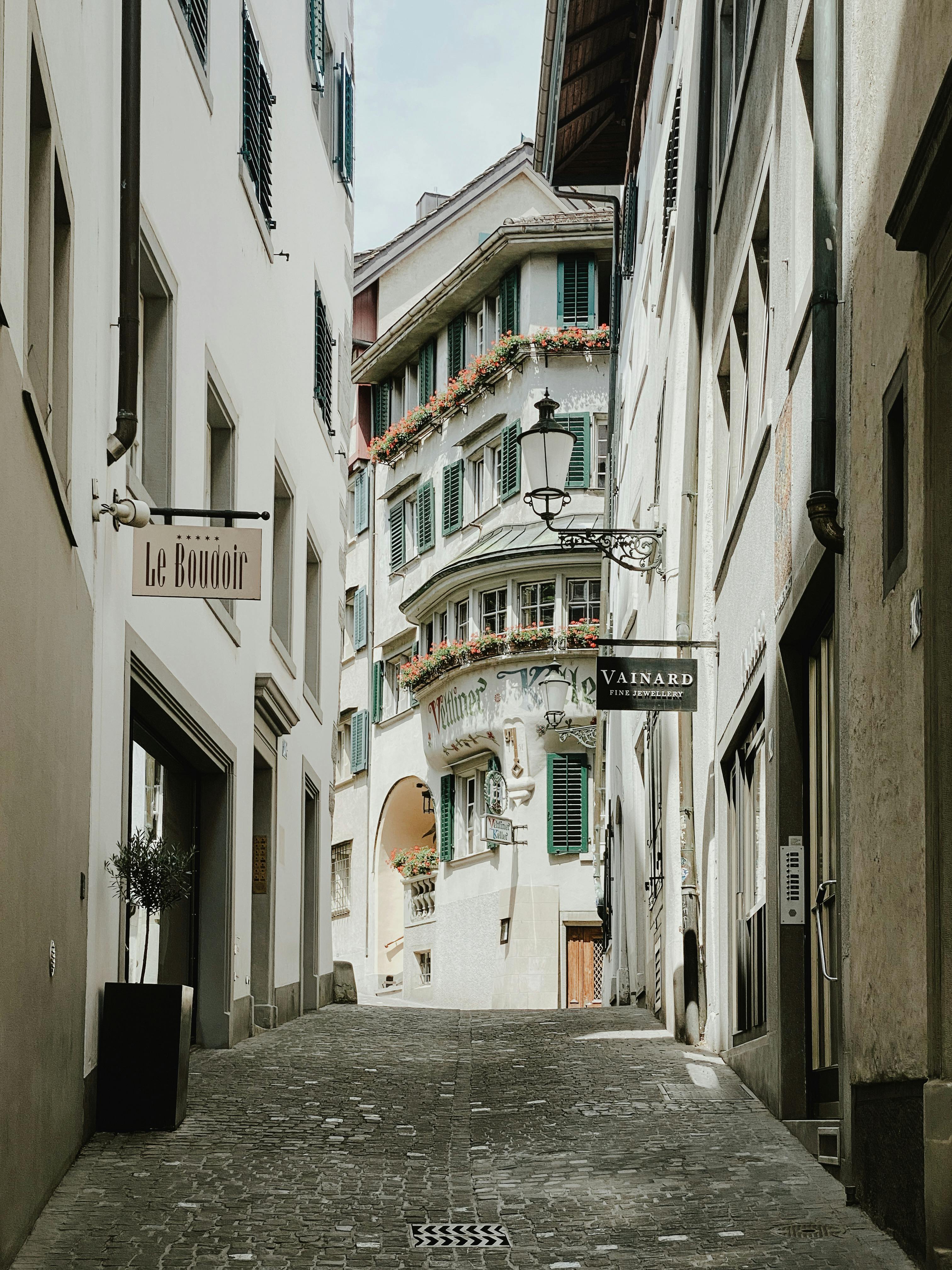 Narrow, Cobblestone Street in Shadow · Free Stock Photo