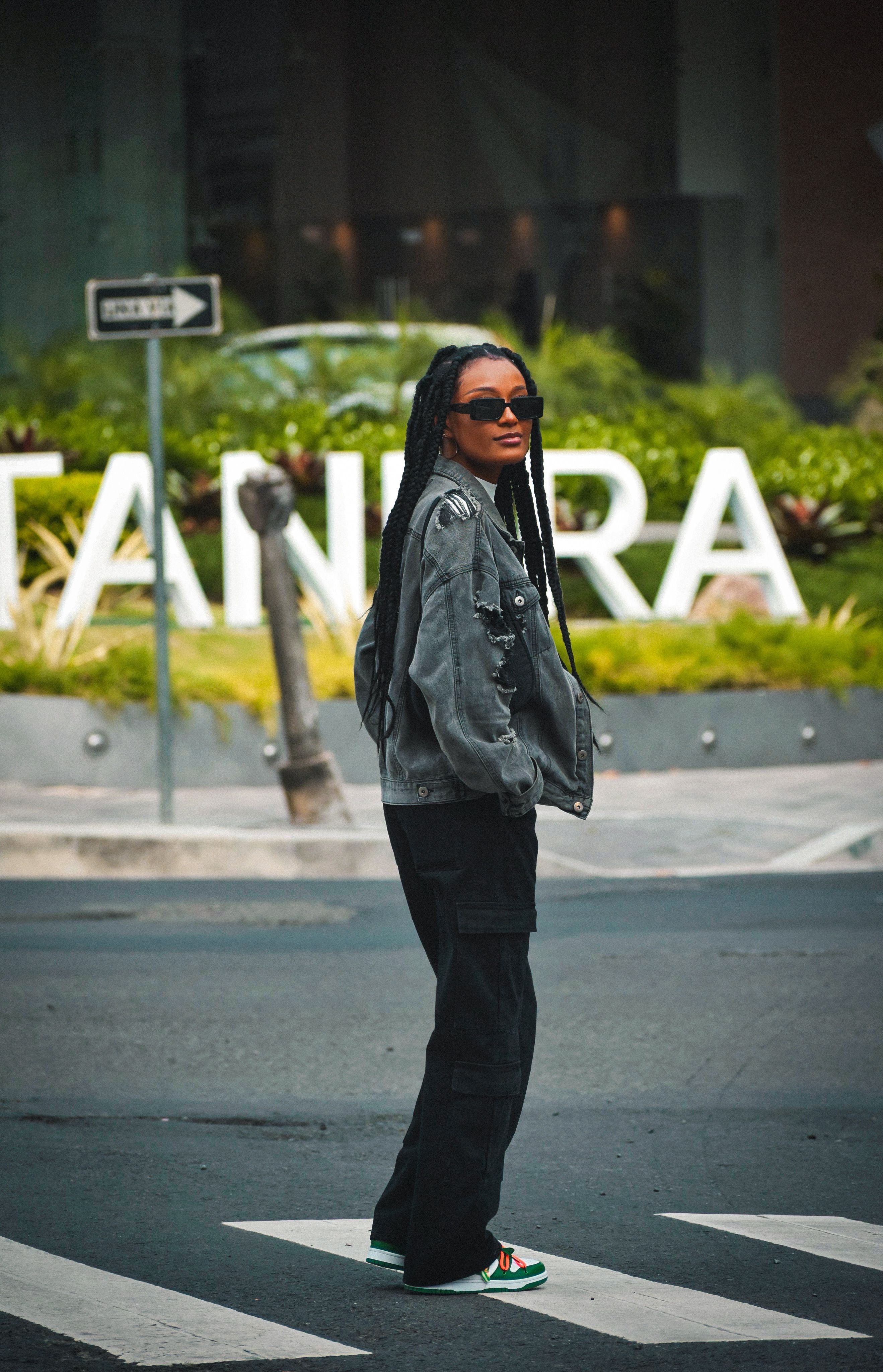 Woman in Jean Jacket Standing on Crosswalk · Free Stock Photo