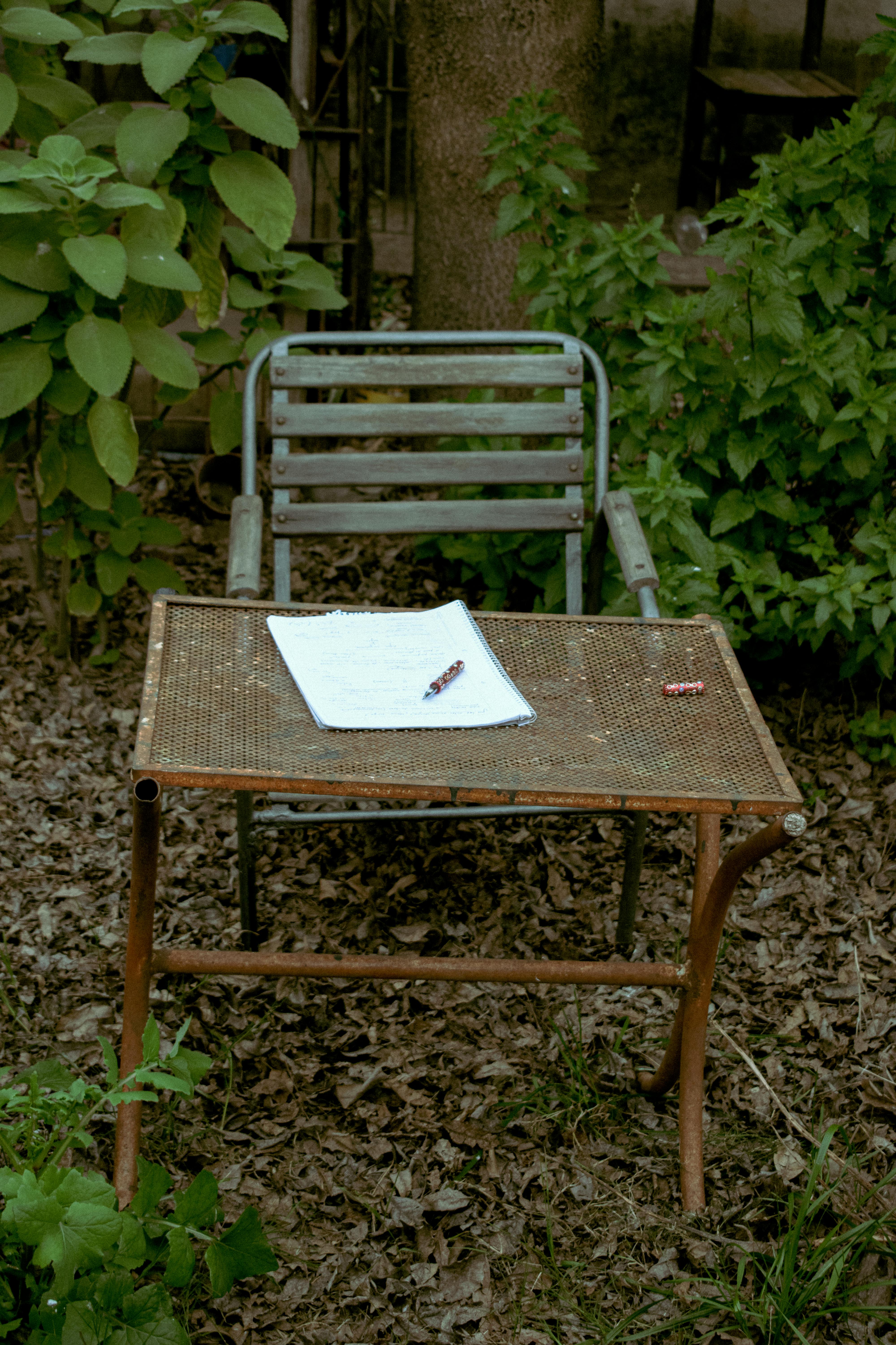 Table and Chair on Ground · Free Stock Photo