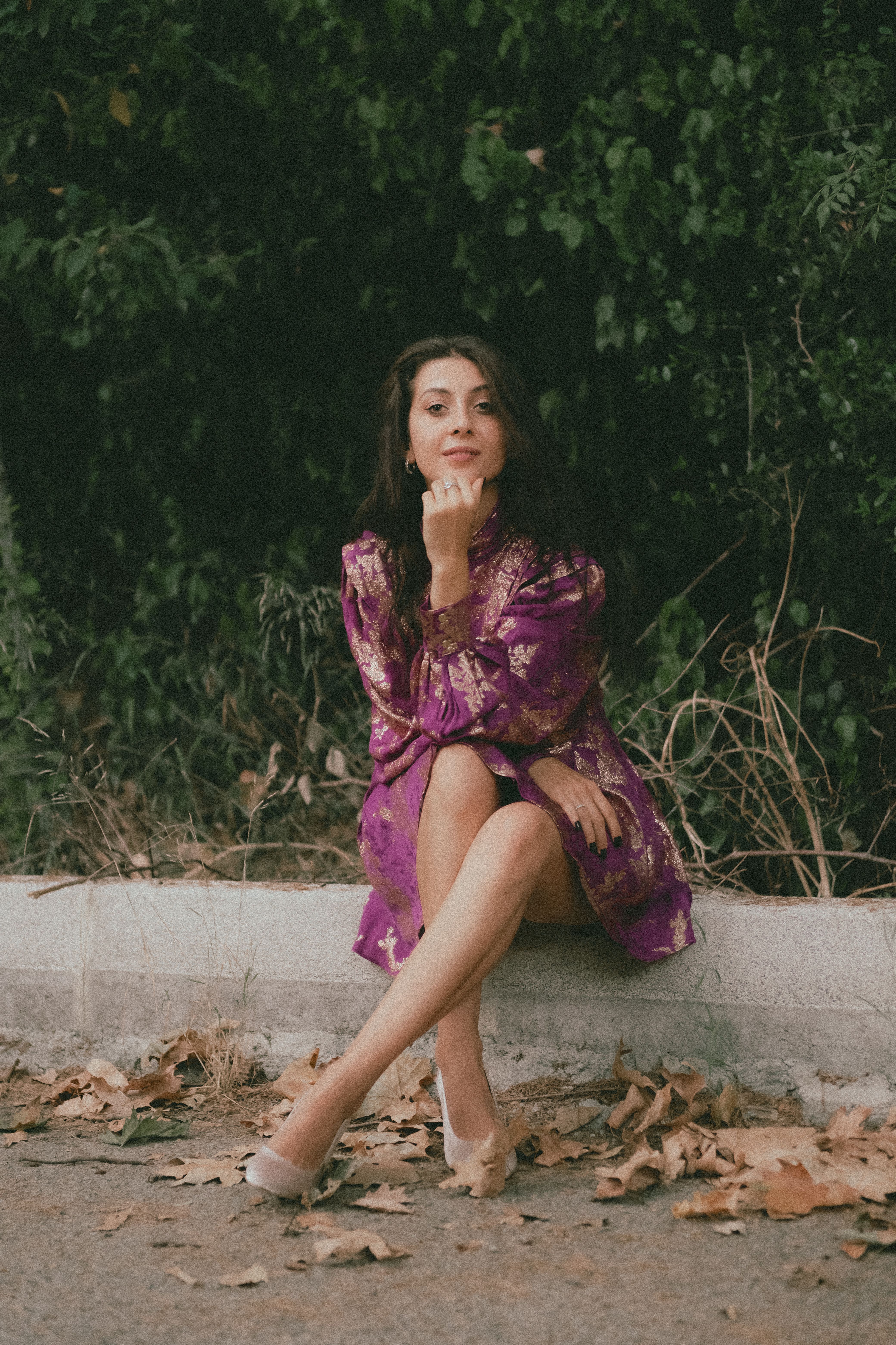 Woman Sitting on Curb · Free Stock Photo