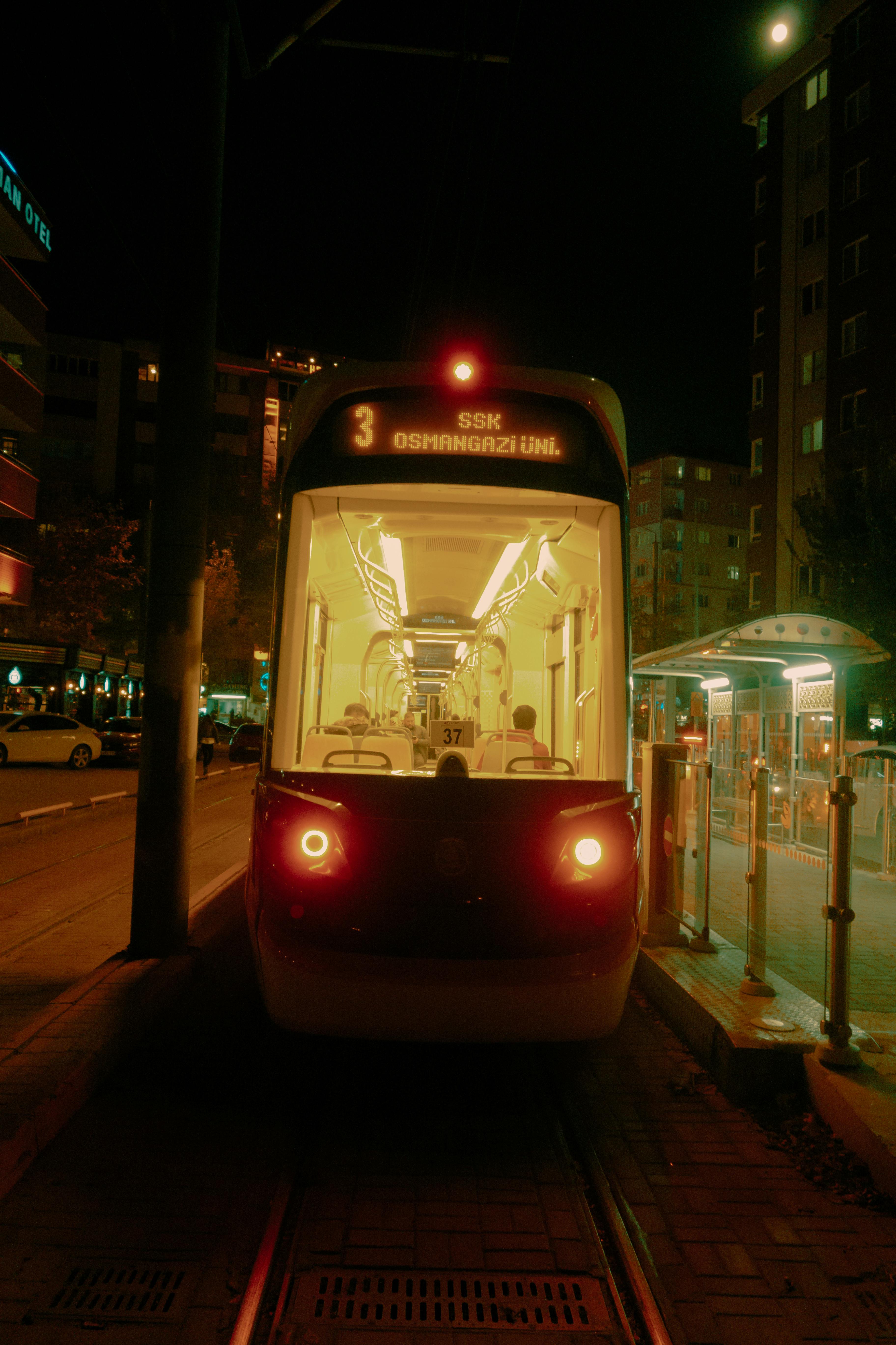 Illuminated Urban Tram at Night · Free Stock Photo