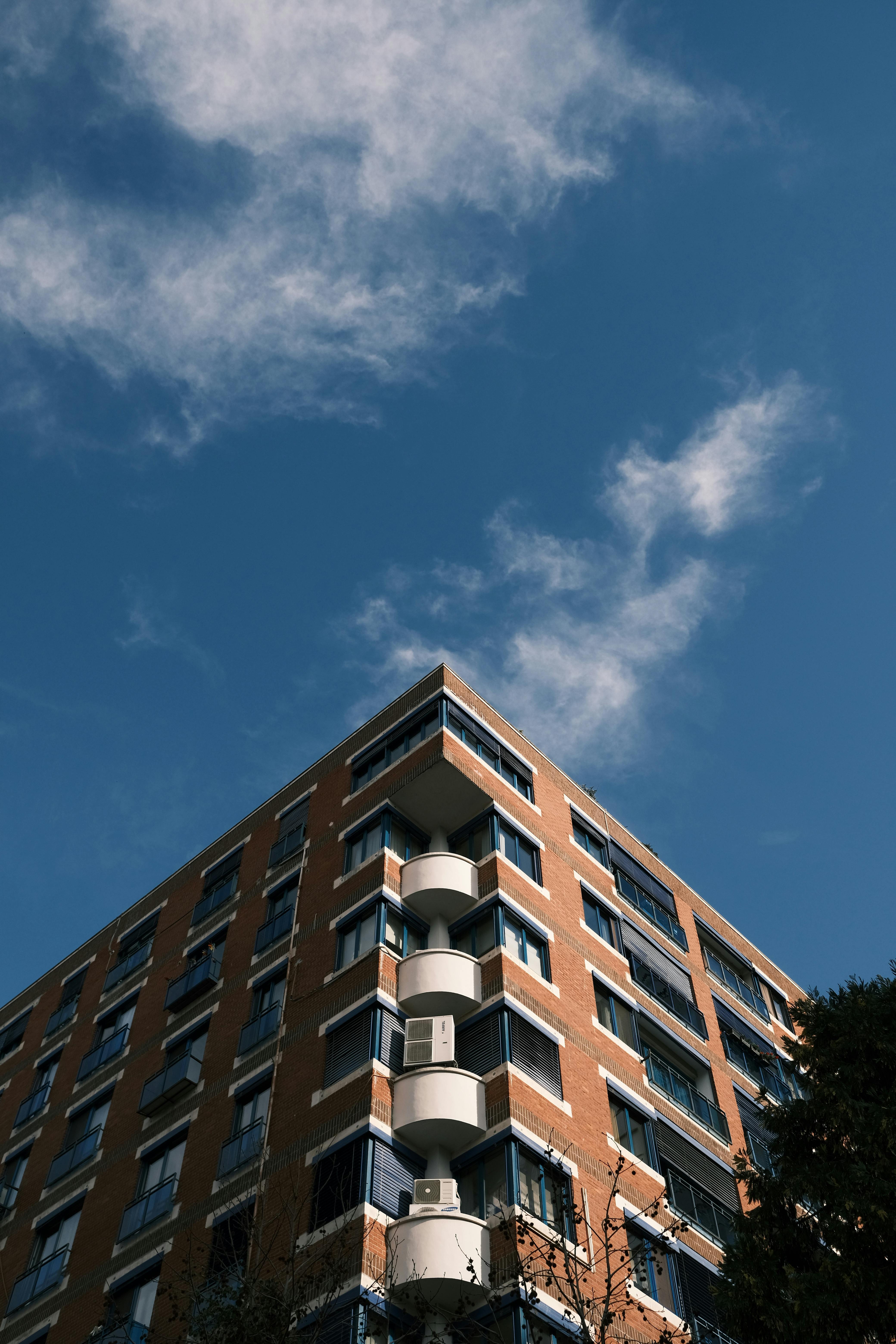 Corner of Building with Apartments · Free Stock Photo