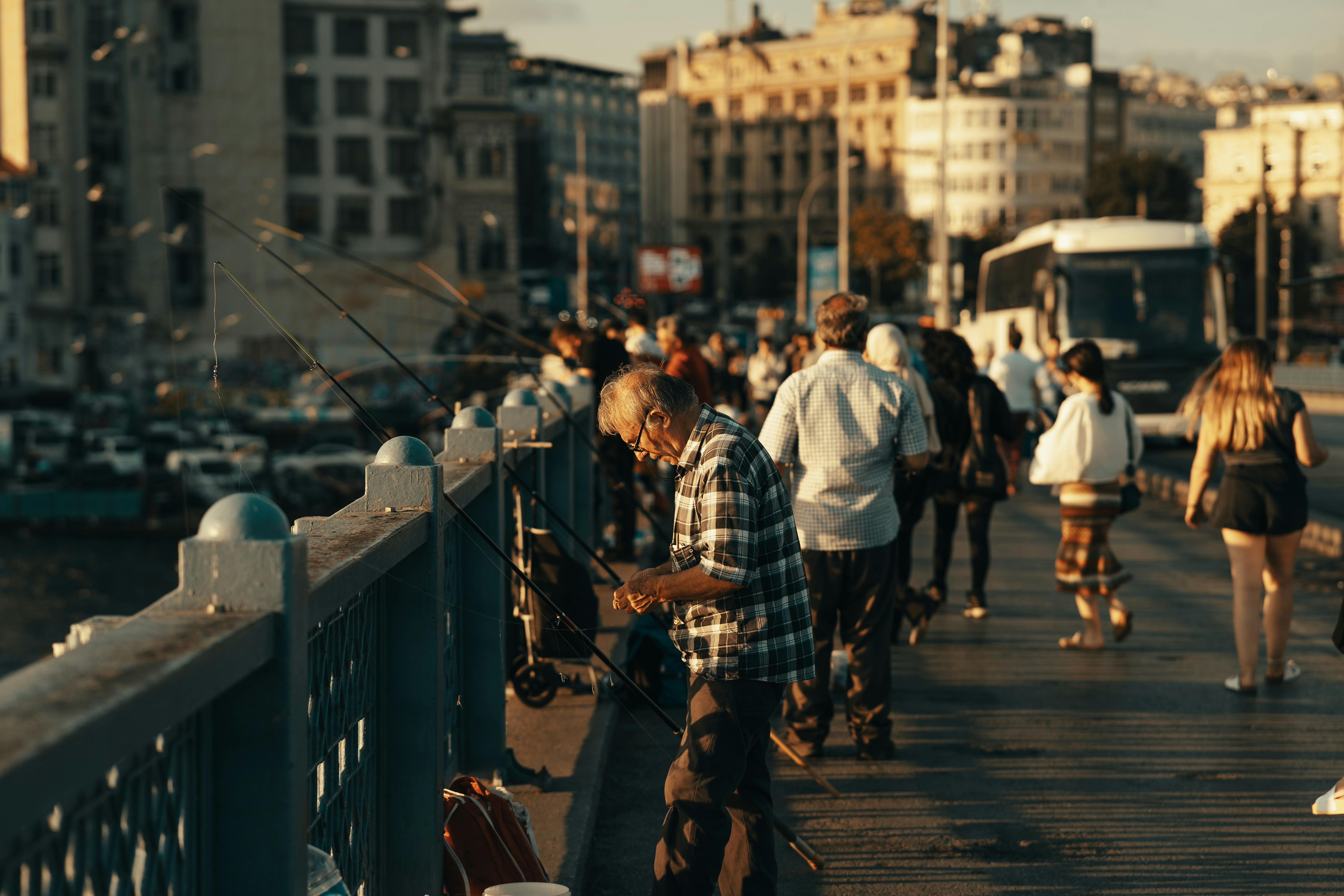Angler Standing on Bridge in Istanbul · Free Stock Photo