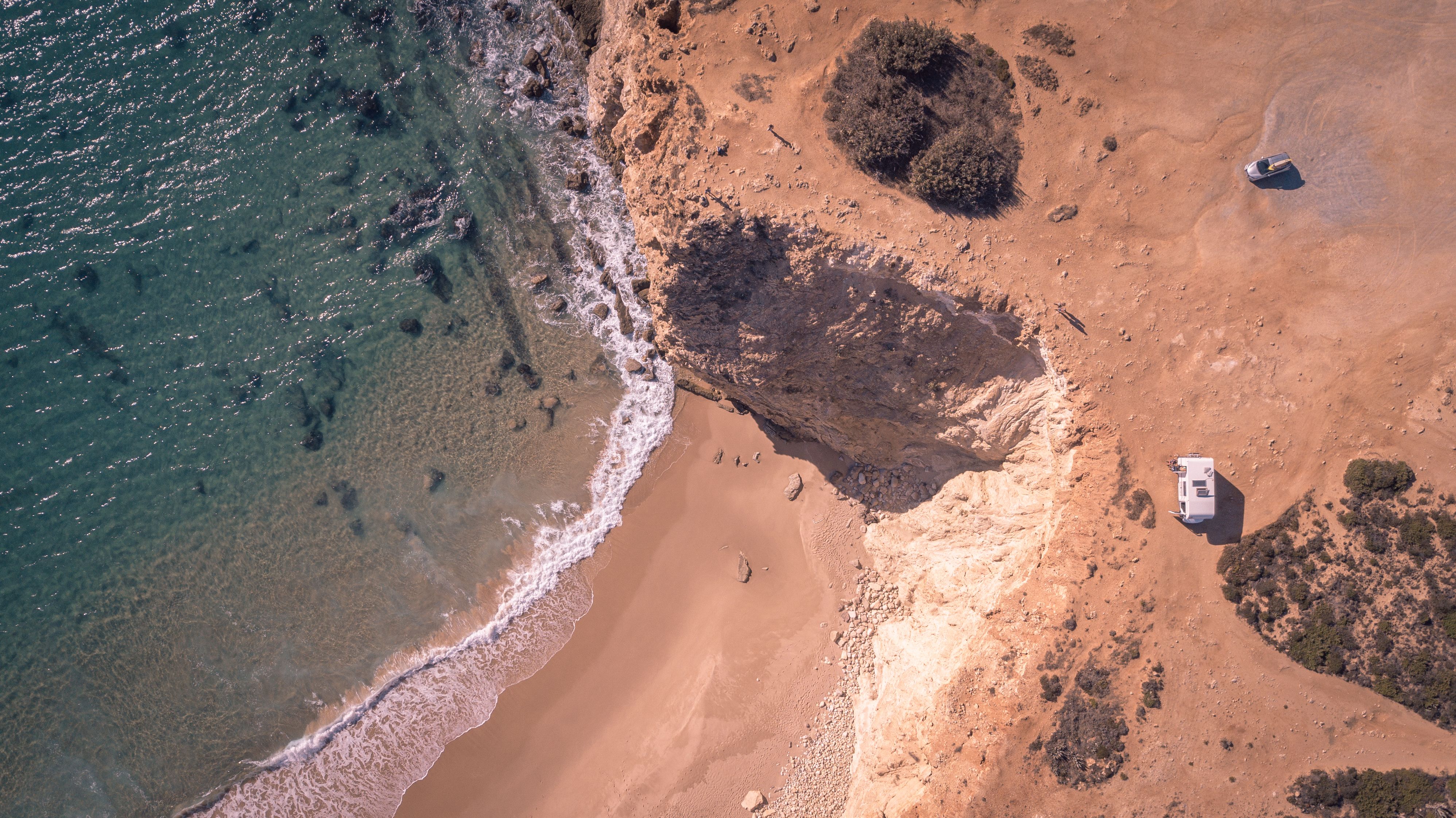 Cliff over Beach on Sea Shore · Free Stock Photo
