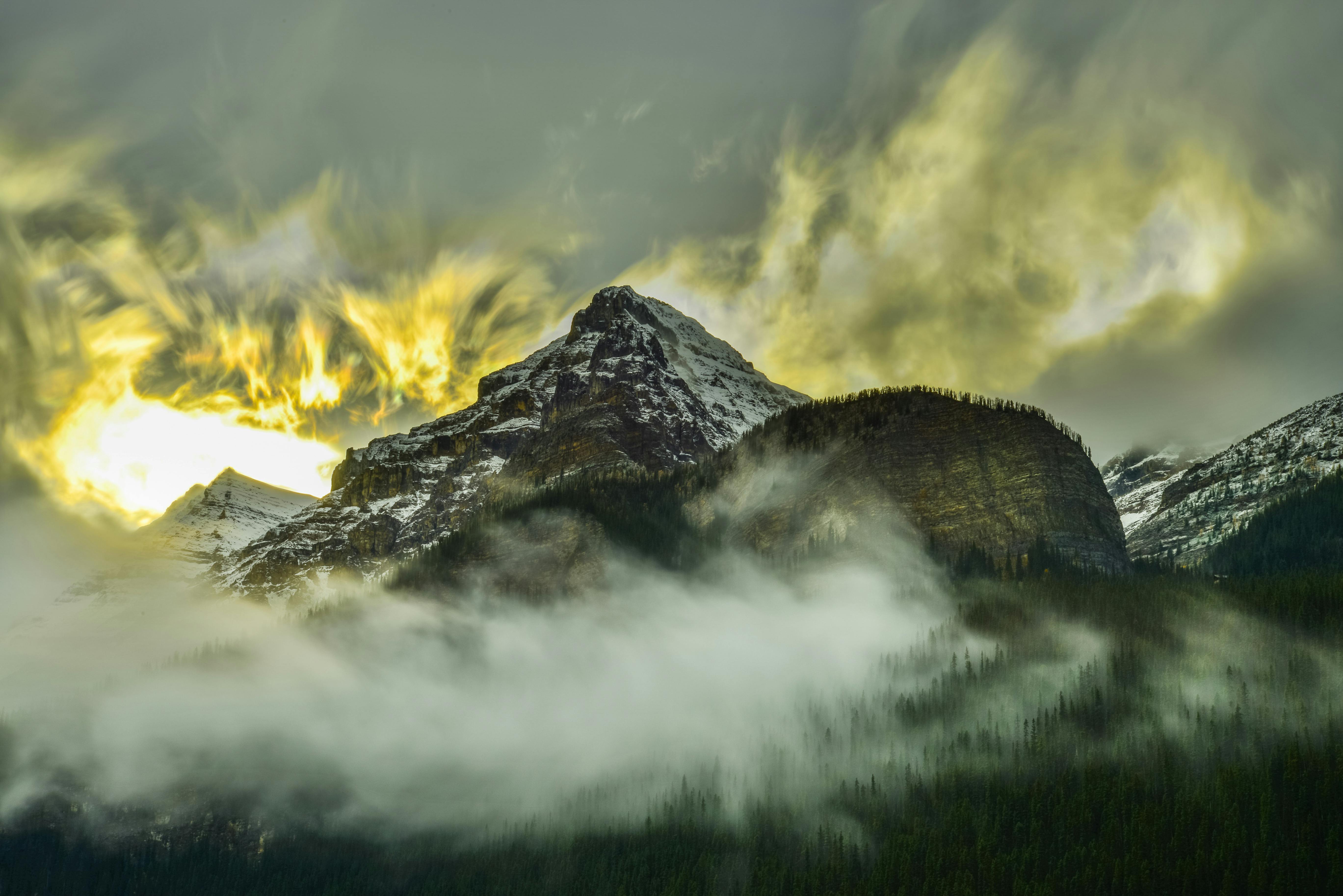 Rising Sun Illuminating the Water Vapor Rising from the Forest on the ...