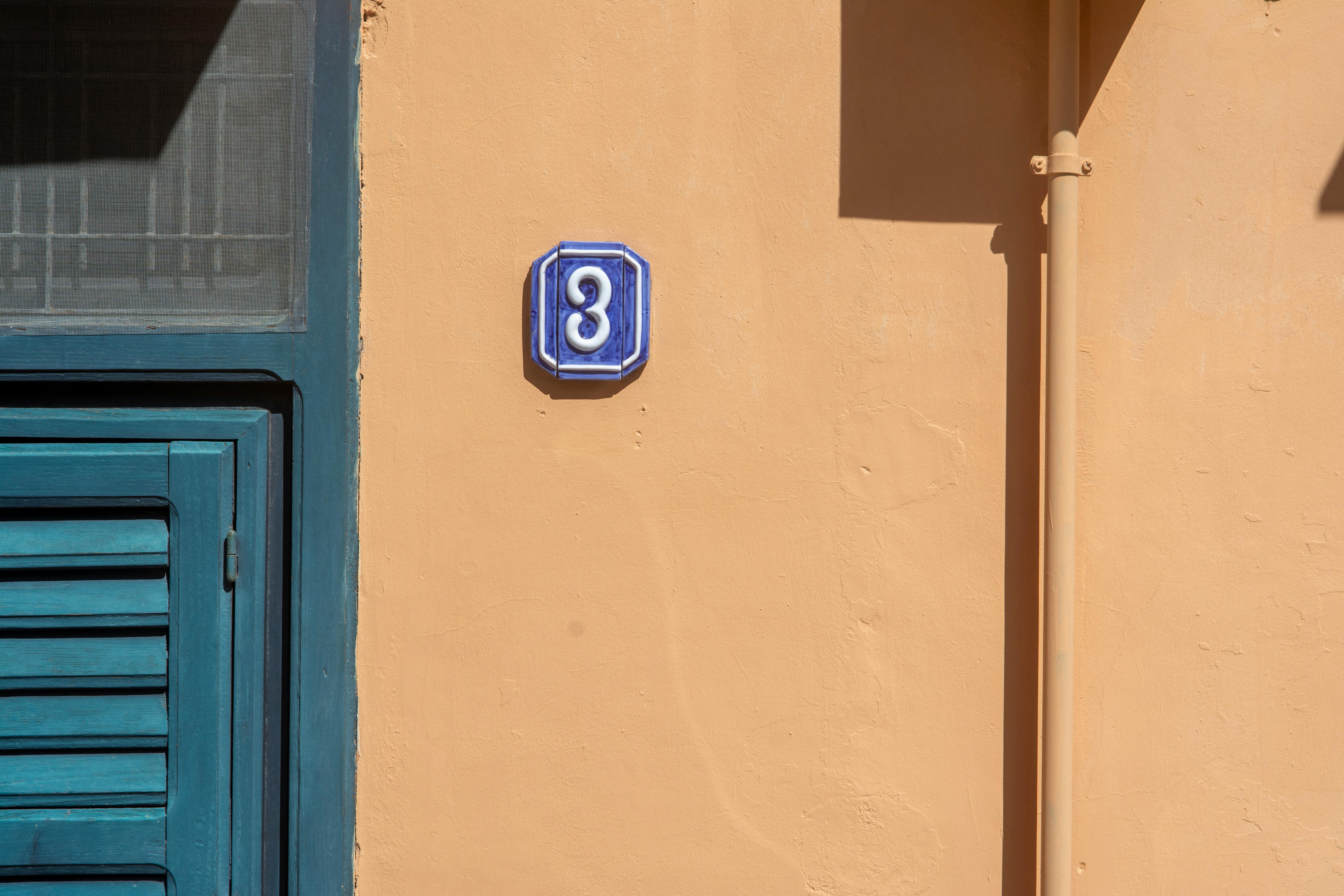 Traditional Building Number Plate on Wall · Free Stock Photo