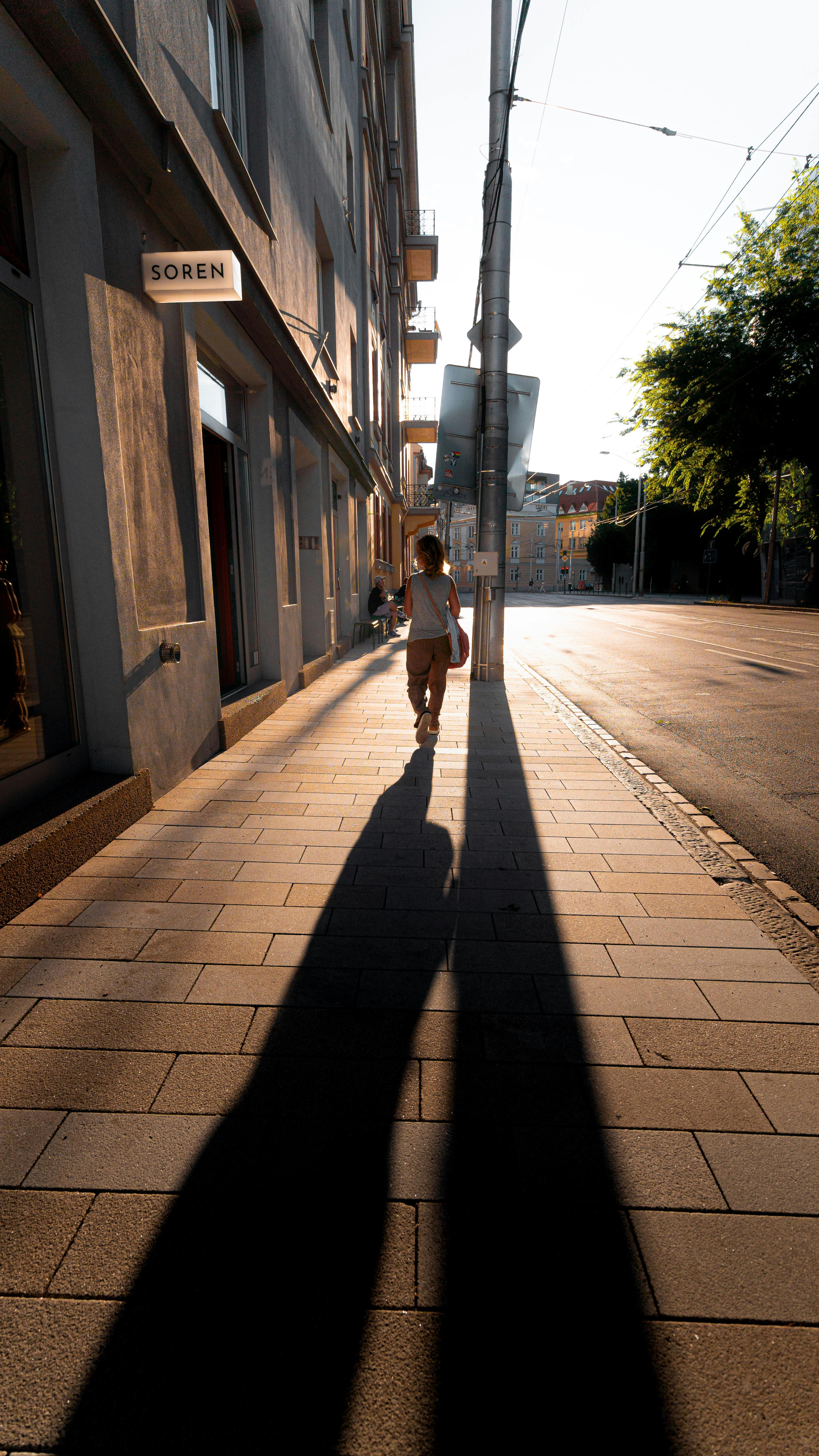 Shadows on the Sidewalk at Sunset · Free Stock Photo
