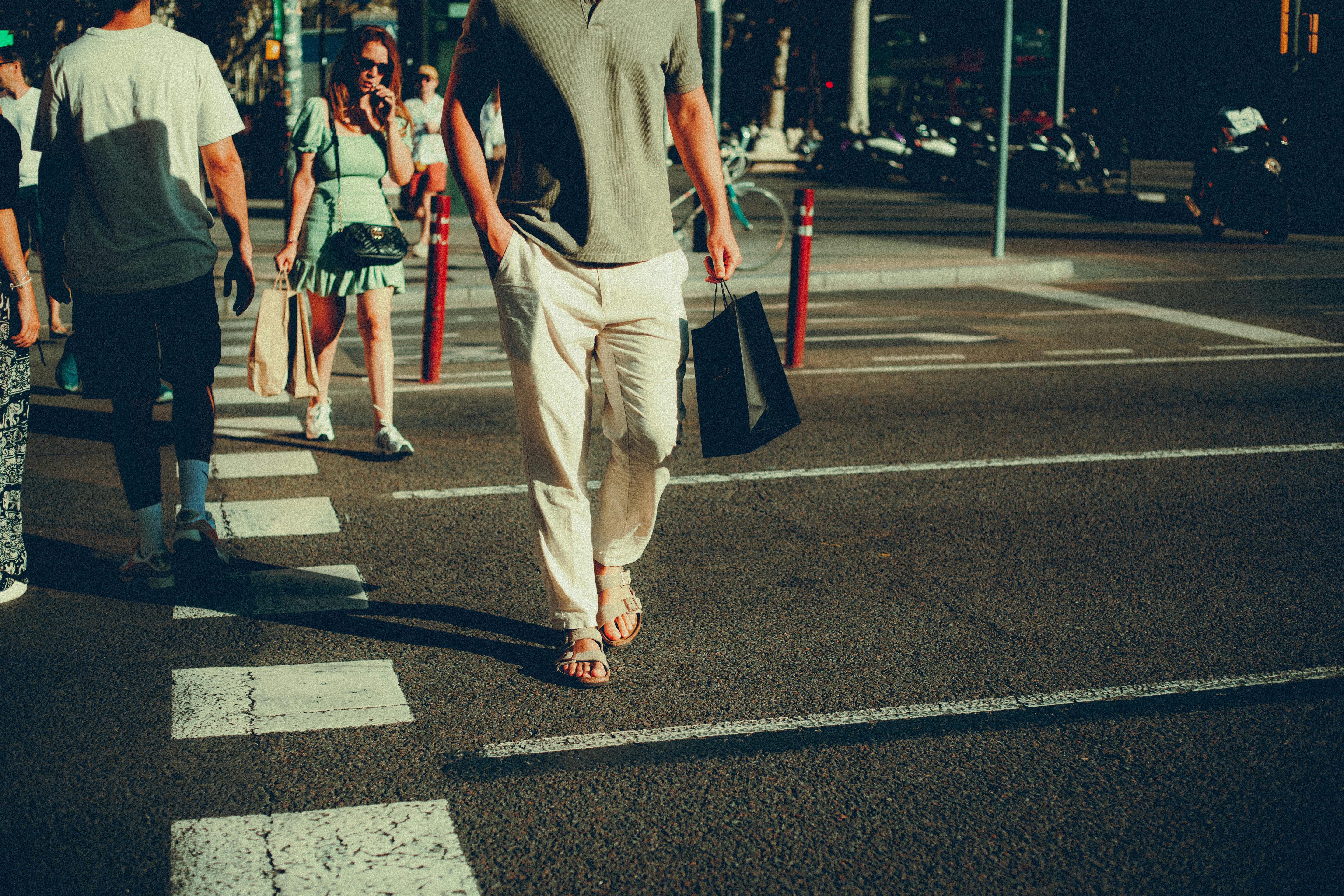 Closeup of Pedestrians Walking on the Road · Free Stock Photo