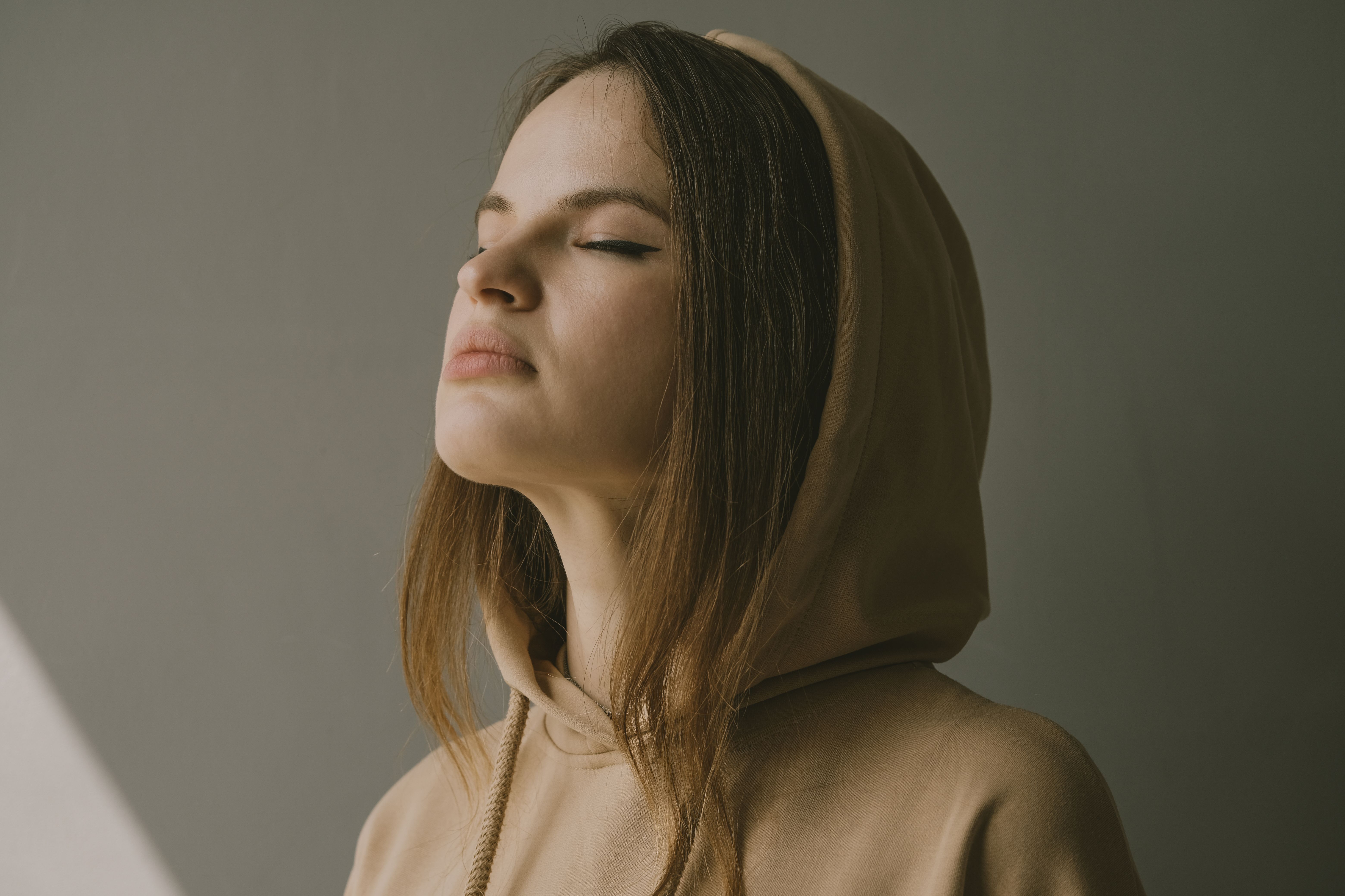 a portrait of a beautiful girl with closed eyes thinki · Free Stock Photo